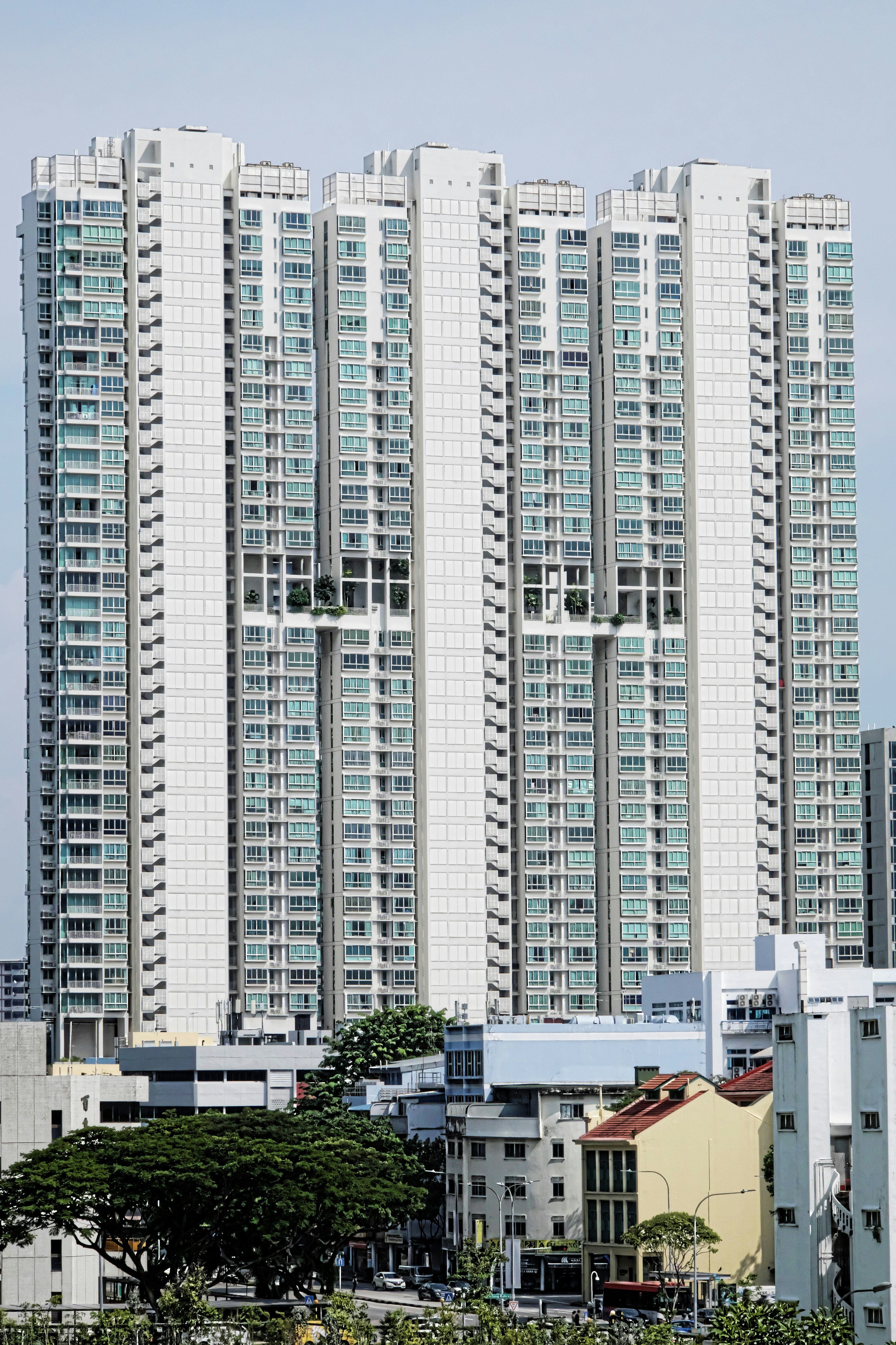 A very tall building with many windows in front of it photo – Free Grey ...