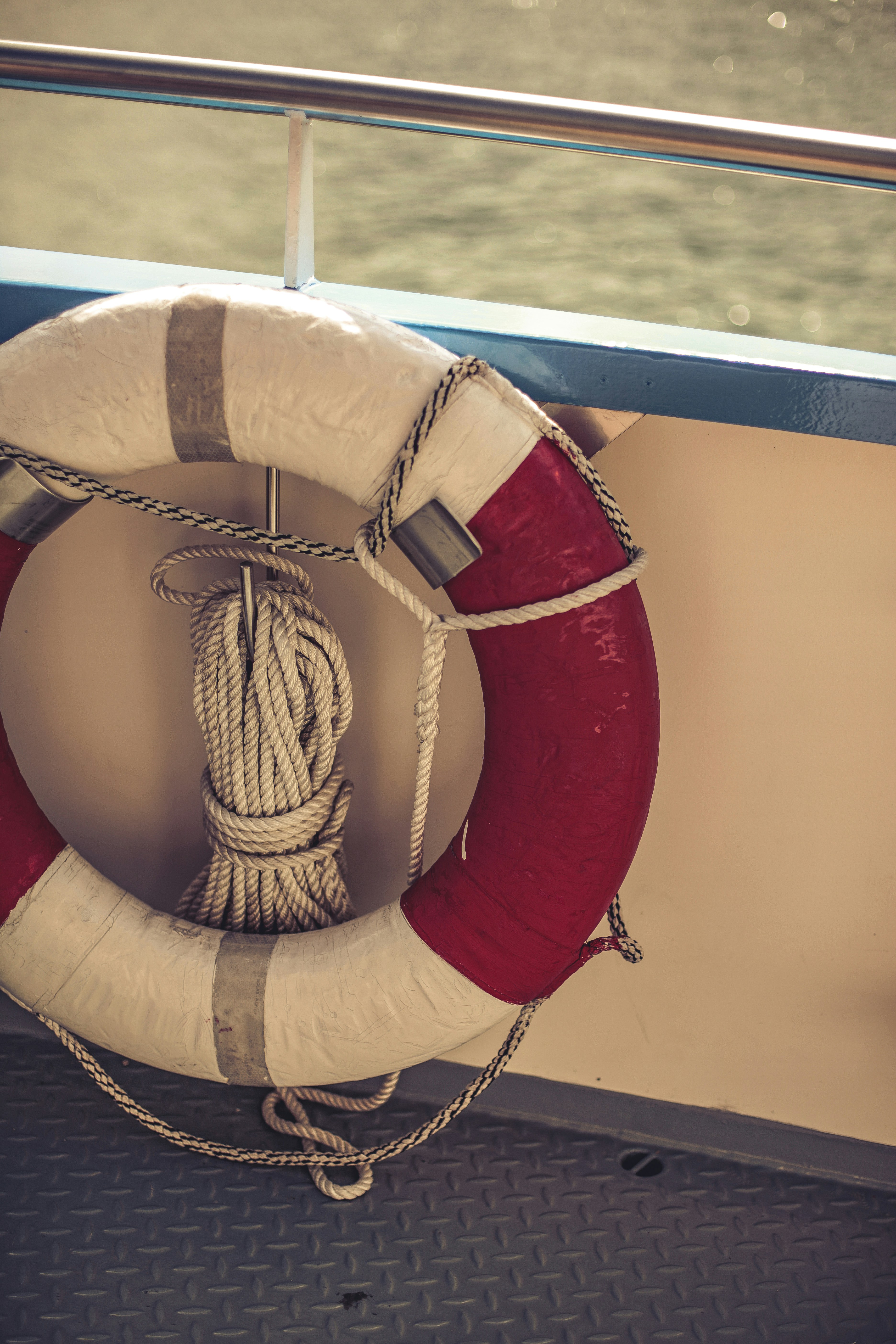A life preserver hanging on the side of a boat photo – Free Computer ...