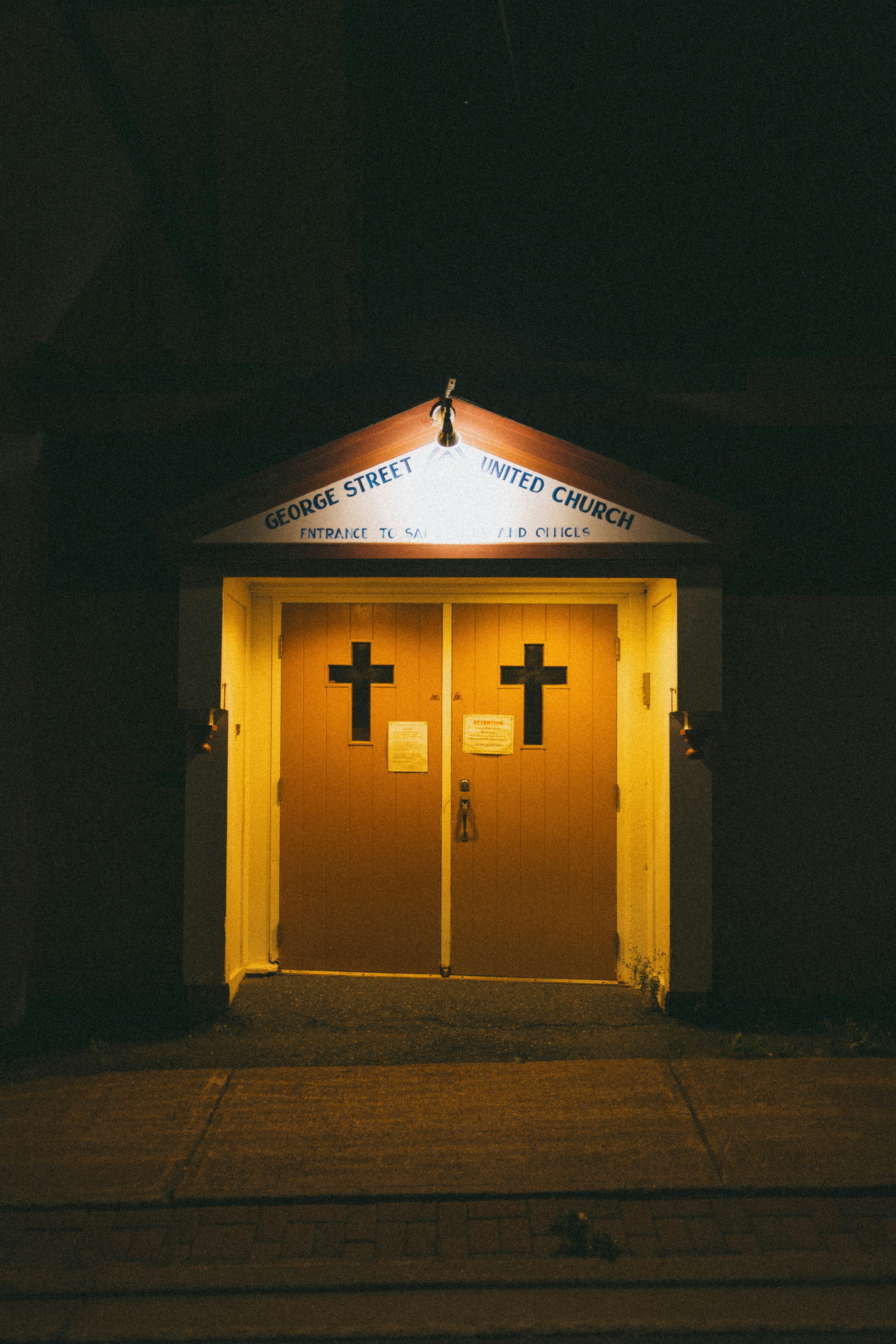 A couple of doors that are in a building photo – Free Religious cross ...