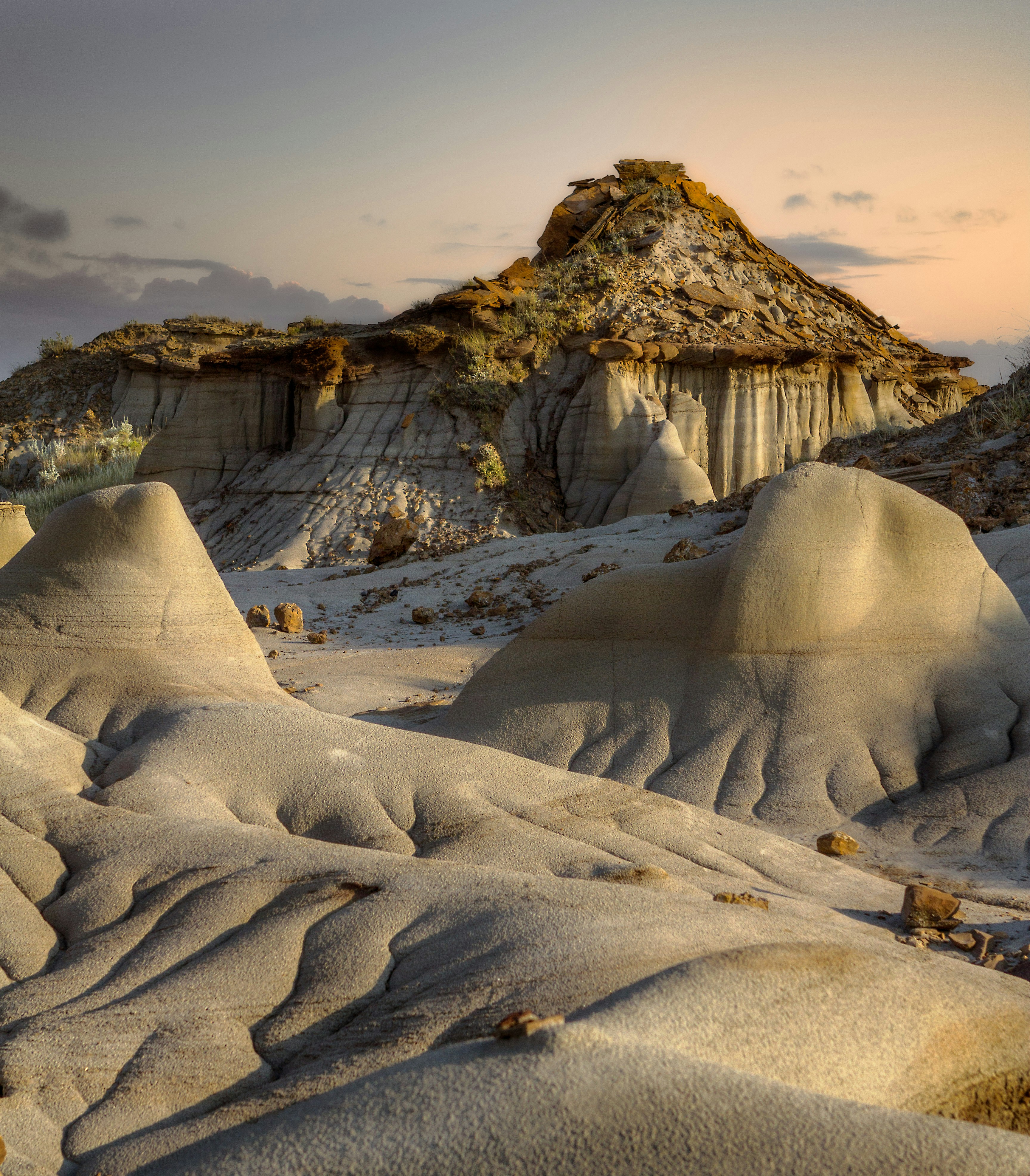 Golden Ridge at Dune's Edge: Sunset Over Layered Badlands
