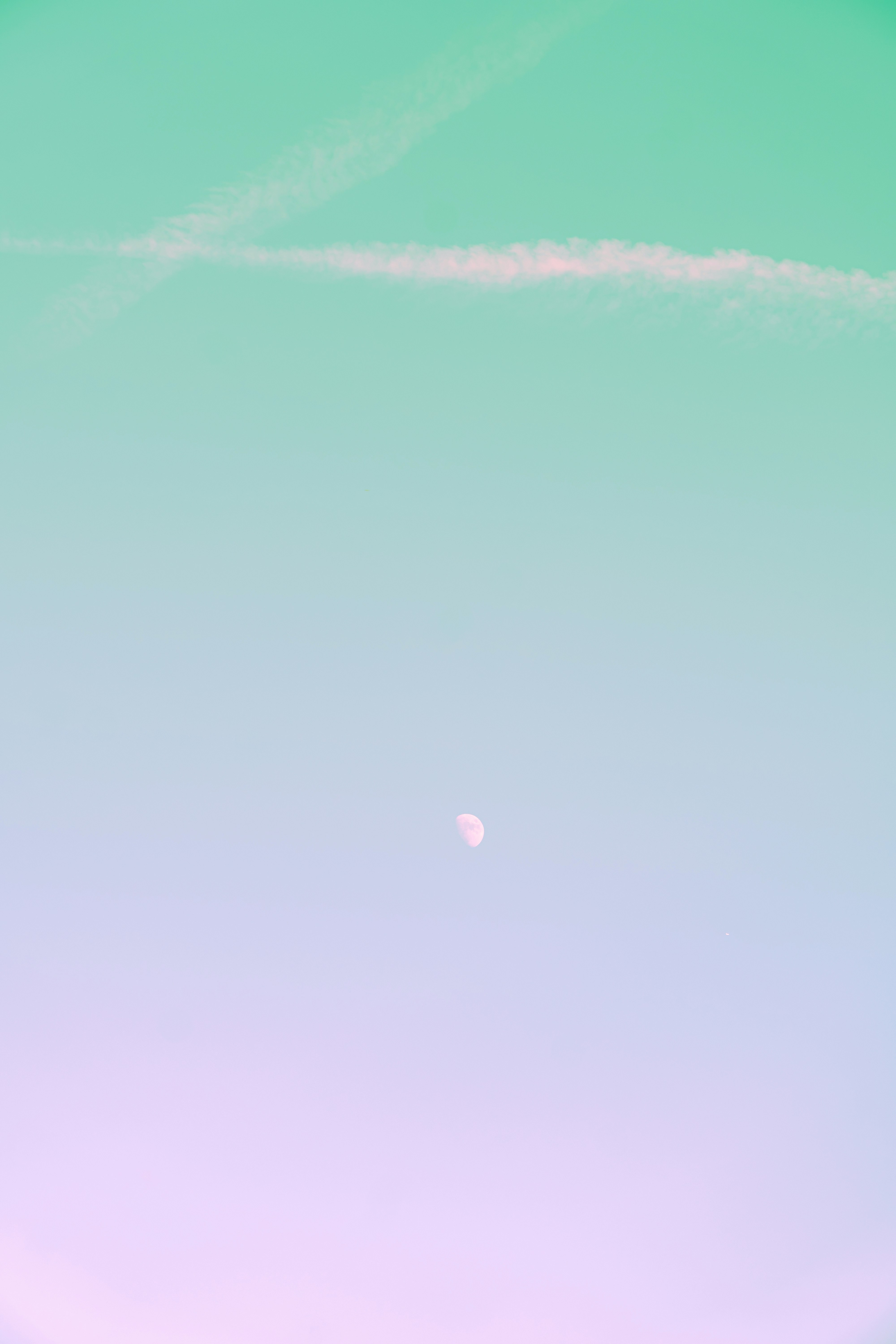 Pastel Sky: Moonlet in a Dreamlike Gradient