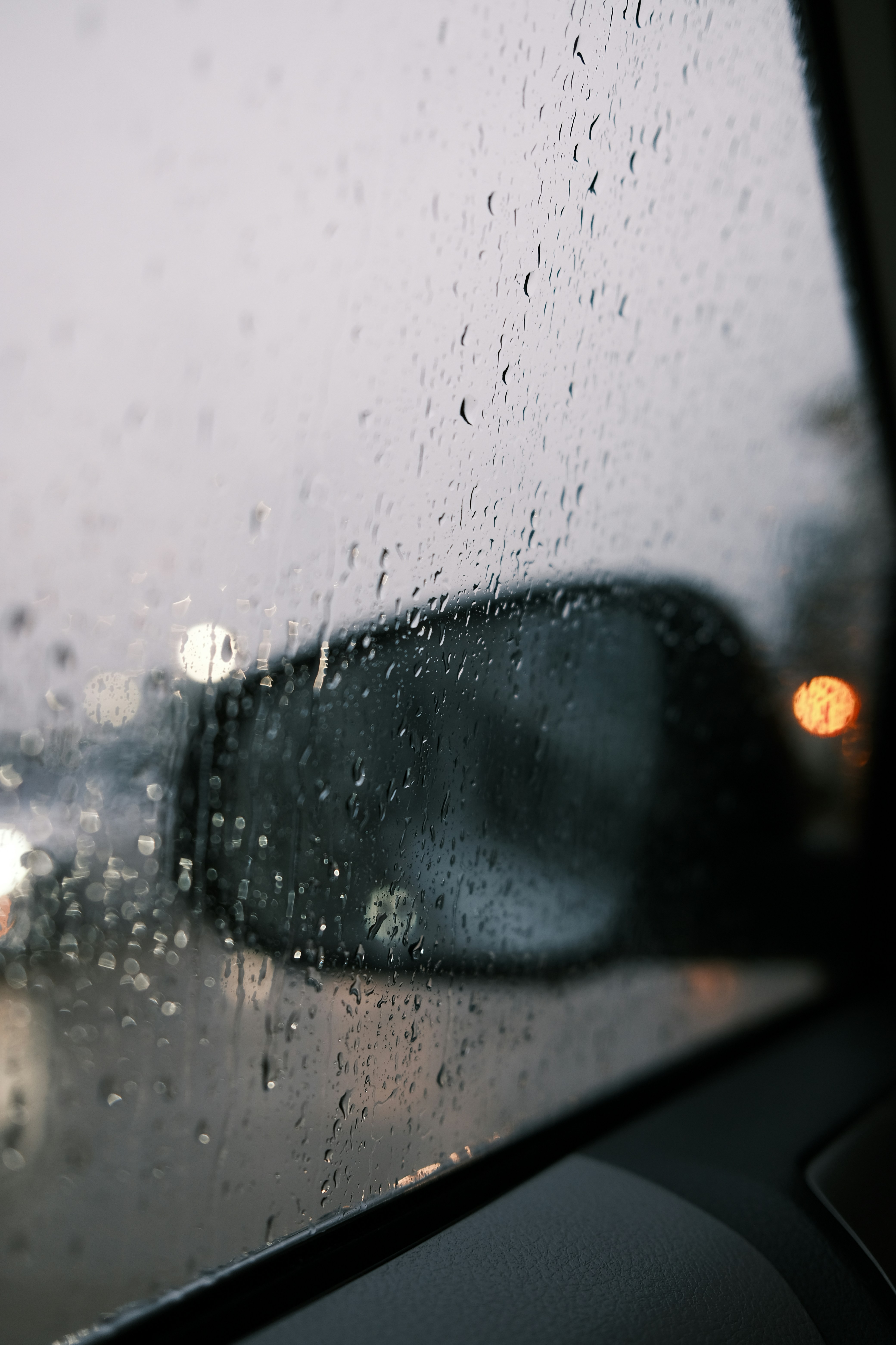 A view of a rain covered windshield from inside a car photo – Free ...