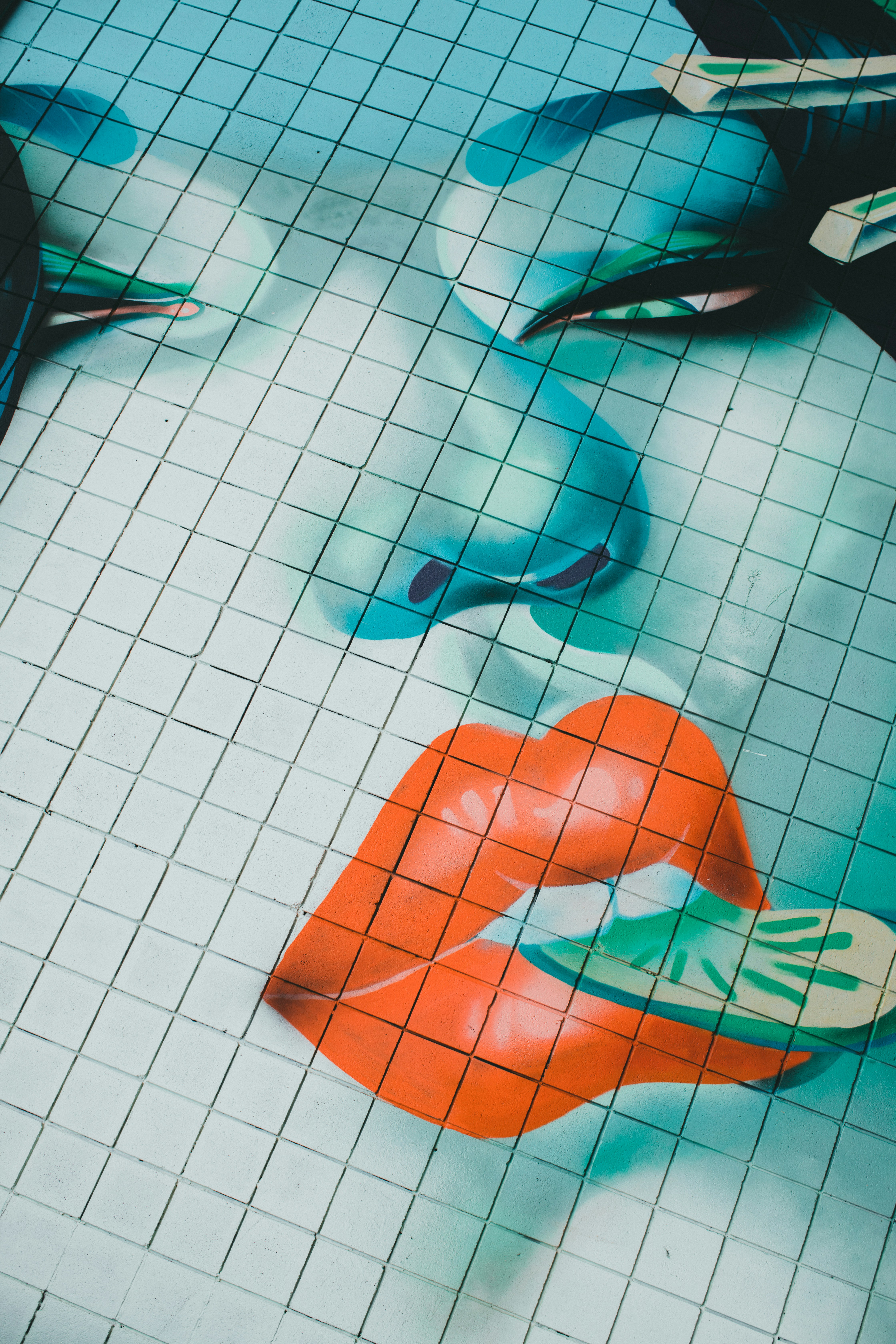 Fragmented Smile: Colorful Masked Urge Across Tile Grid