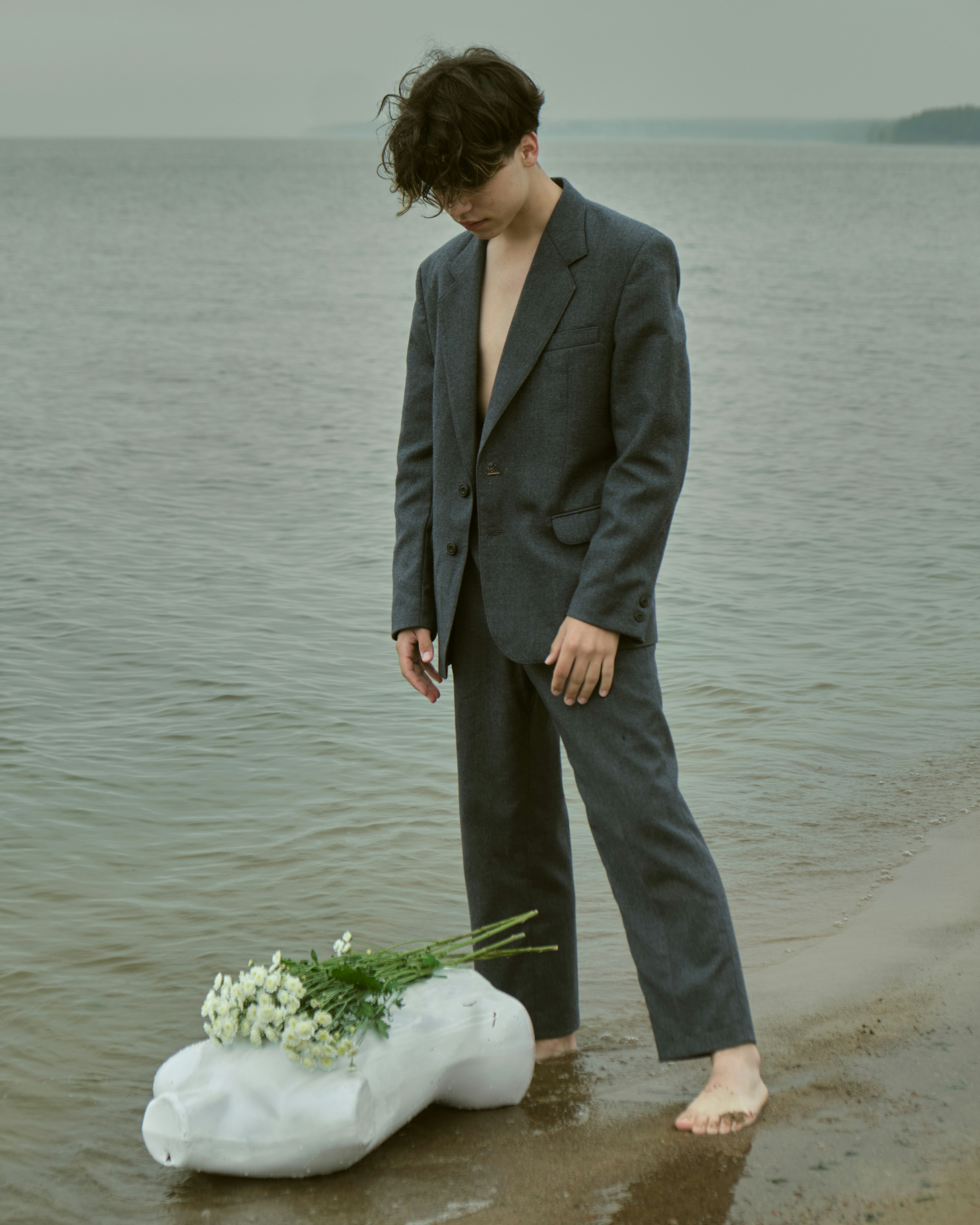 Unbuttoned Shoreline: A Quiet Stare at Dunes and Gray Water