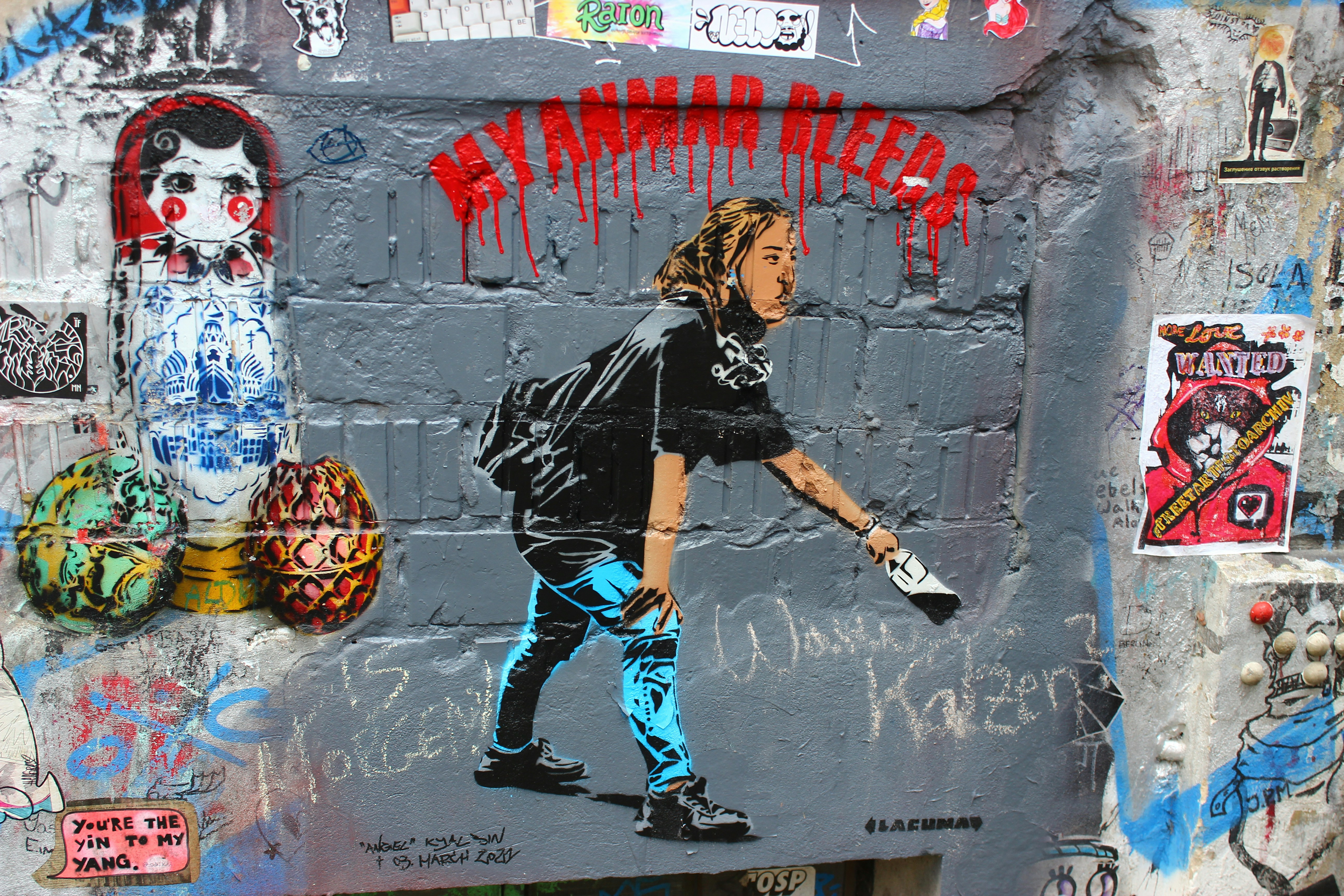 Midstride Graffiti Portrait on a Weathered Concrete Canvas