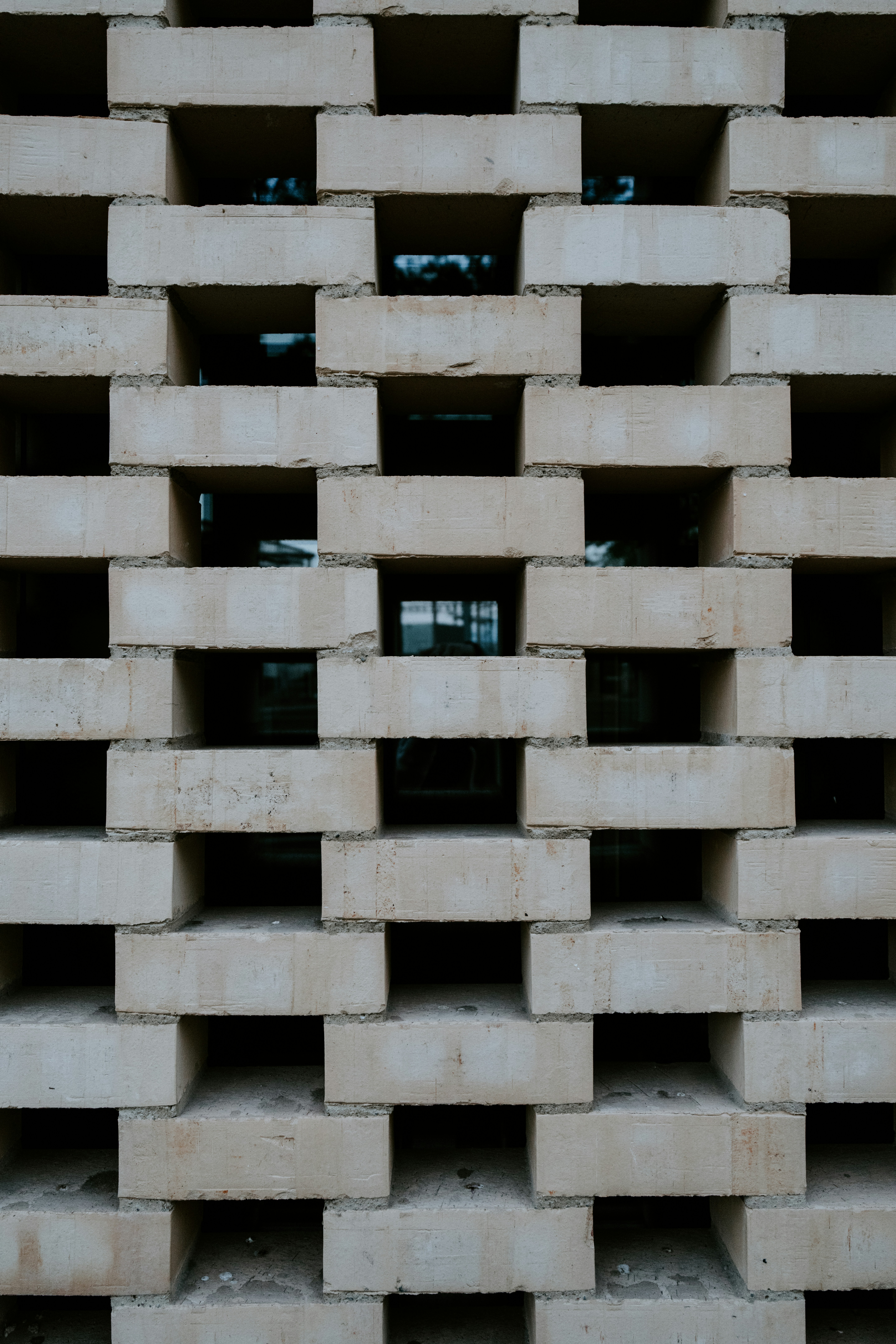 A close up of a building made of concrete blocks photo – Free Grey ...