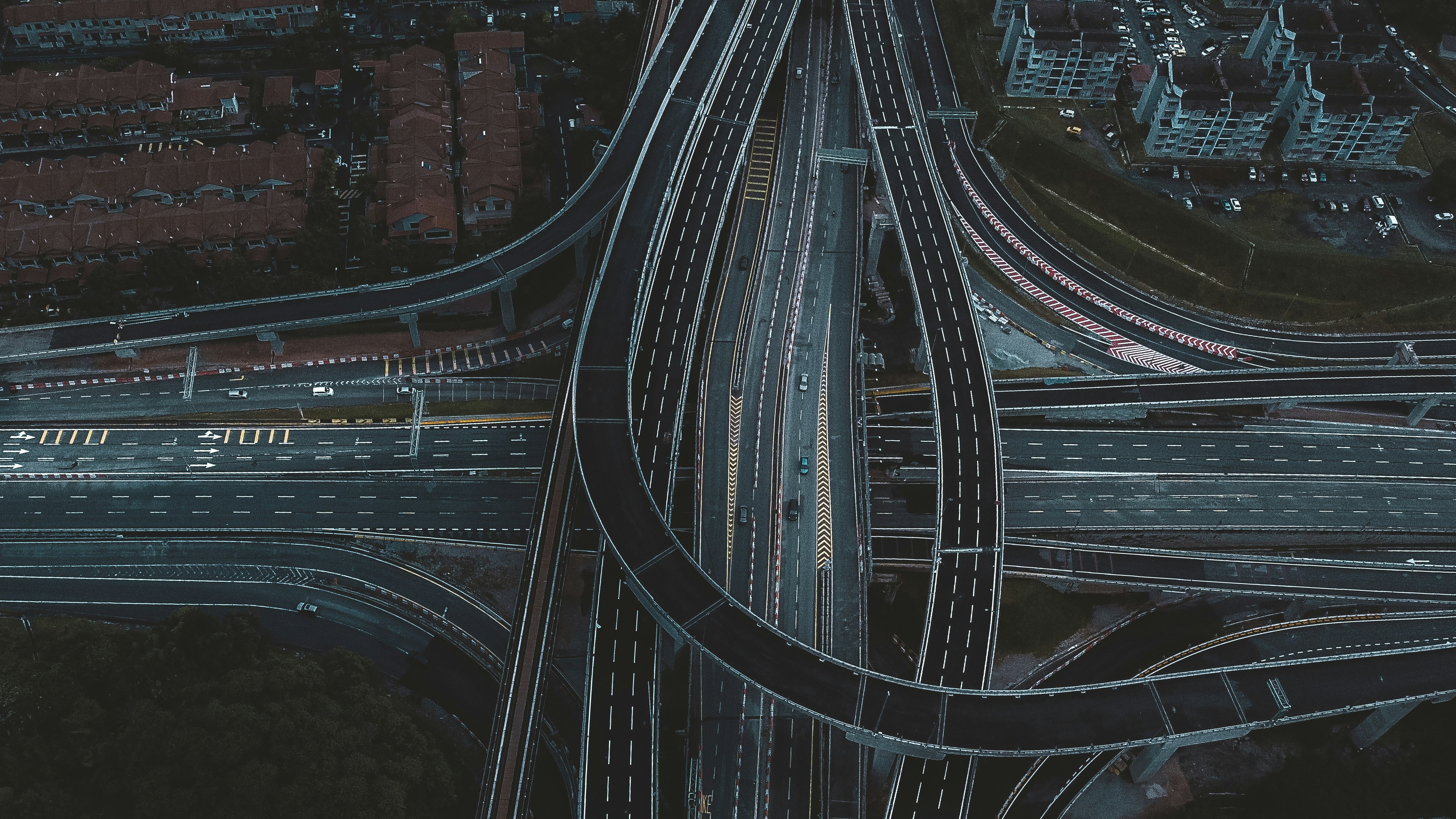 An aerial view of a highway intersection with multiple lanes photo ...