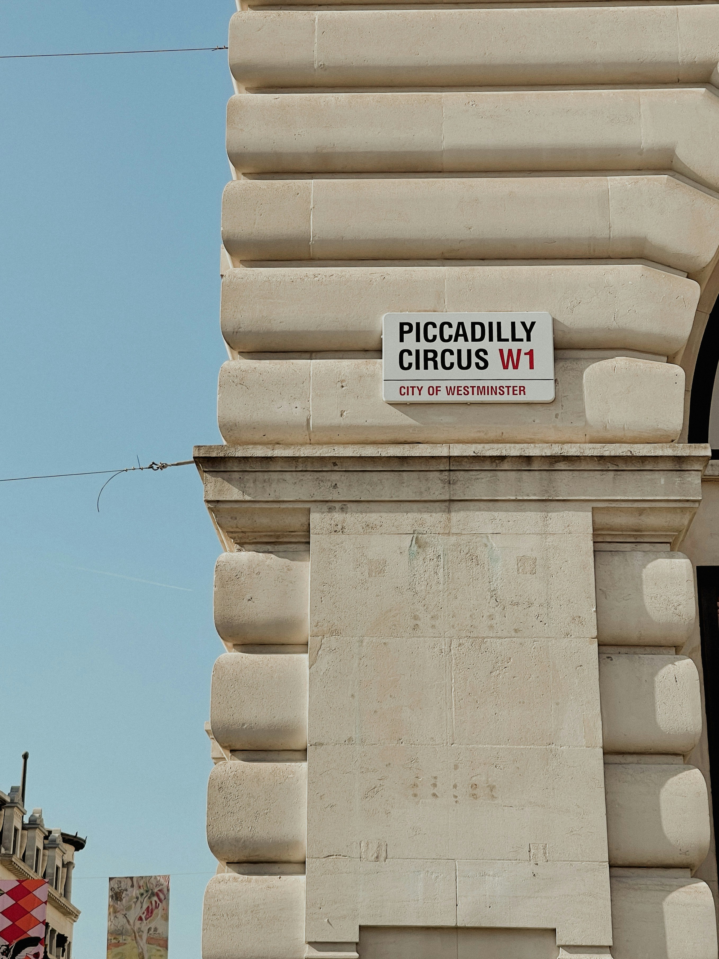 There is a sign on the side of a building photo – Free Architecture ...