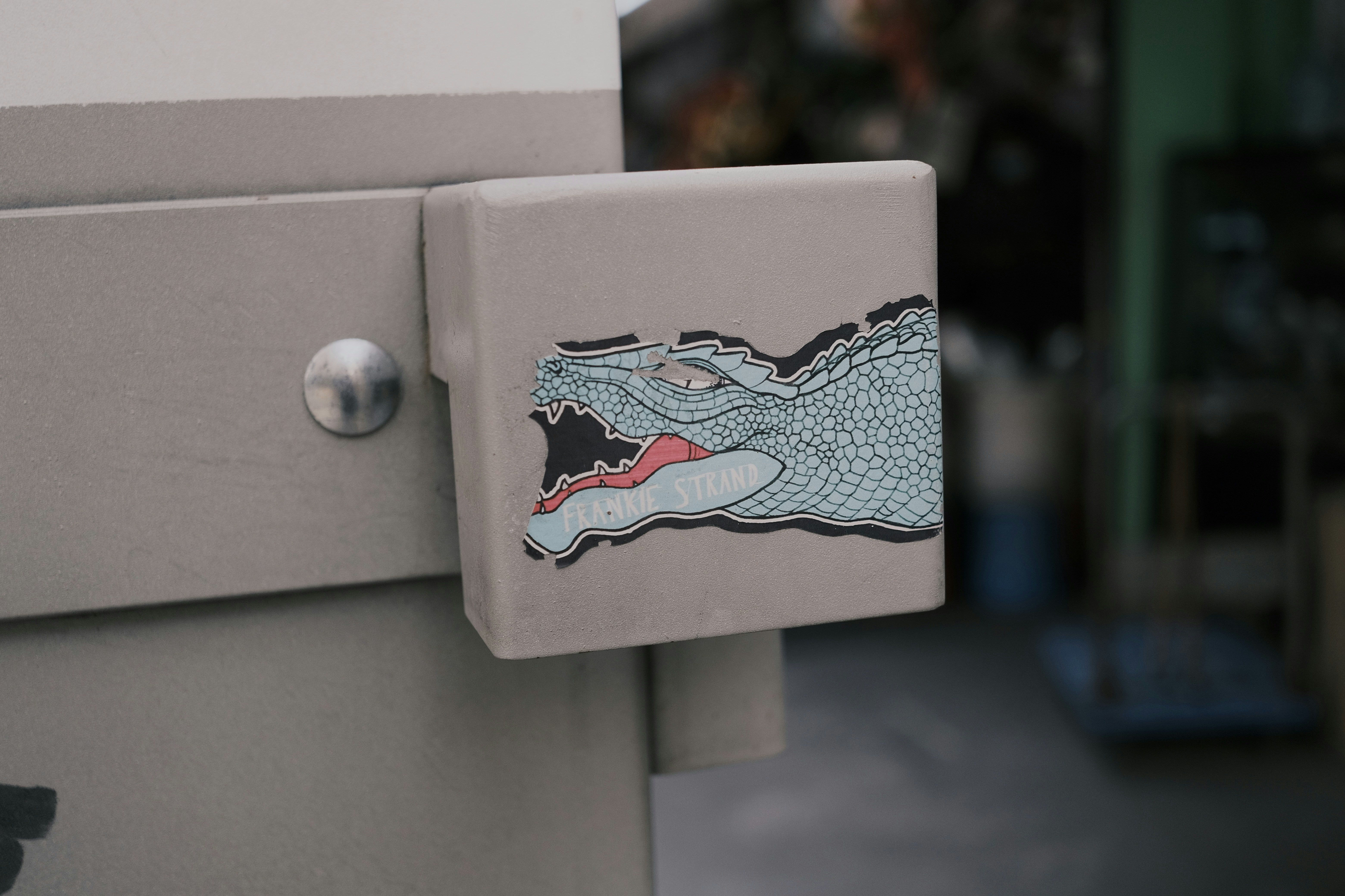 a close up of a door with a sticker on it