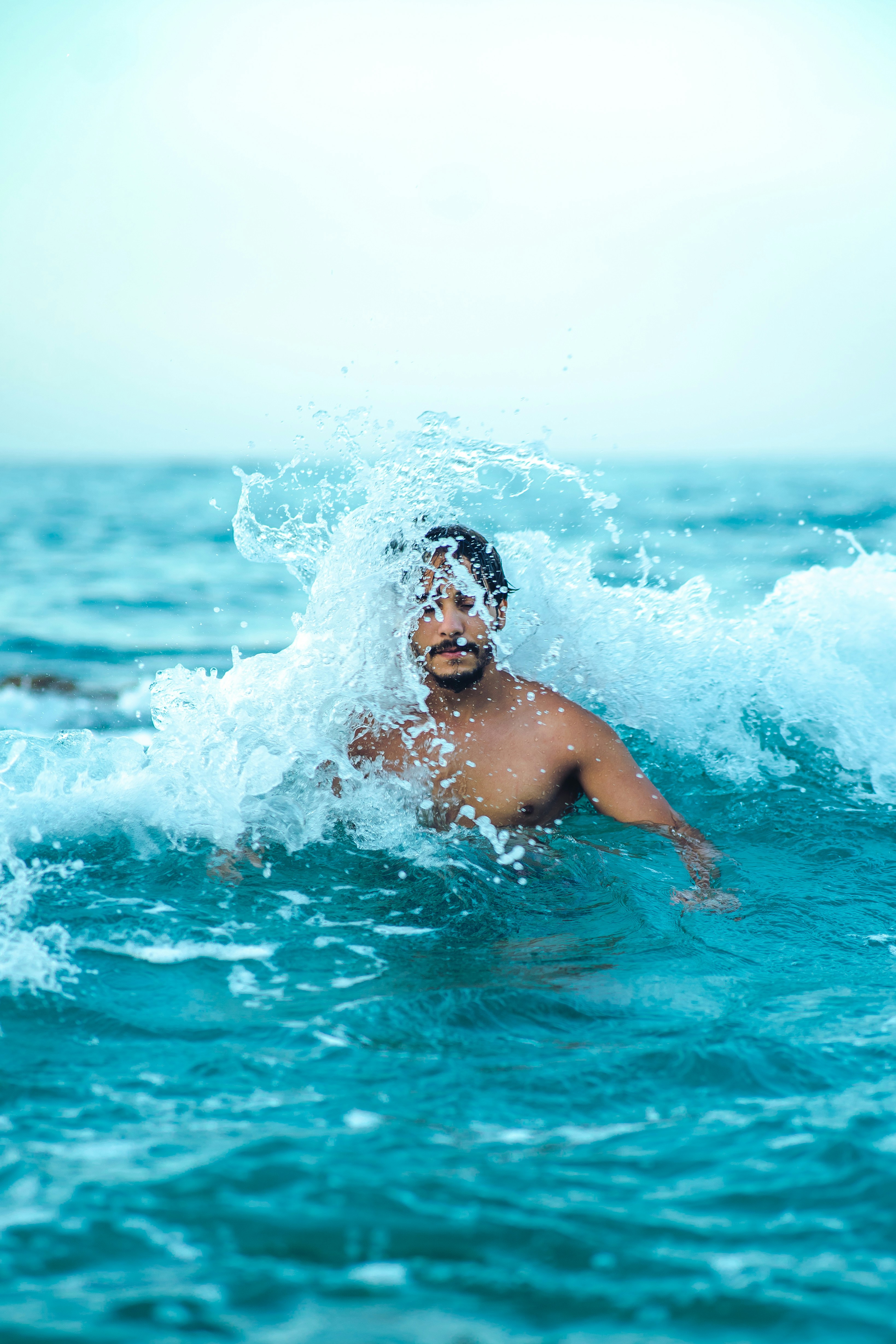 Man Swimming In Ocean