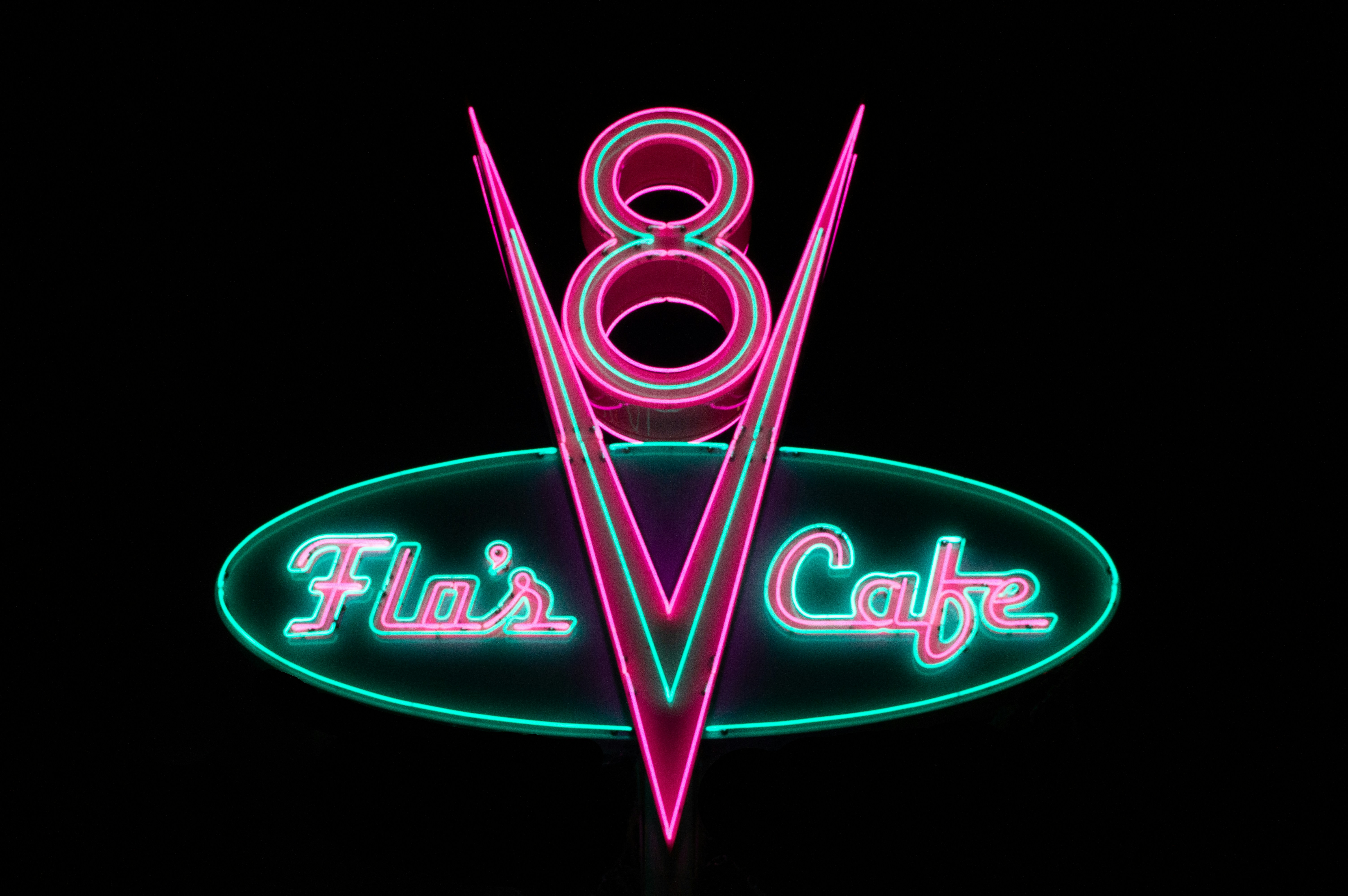a neon sign for a restaurant called flix's cafe