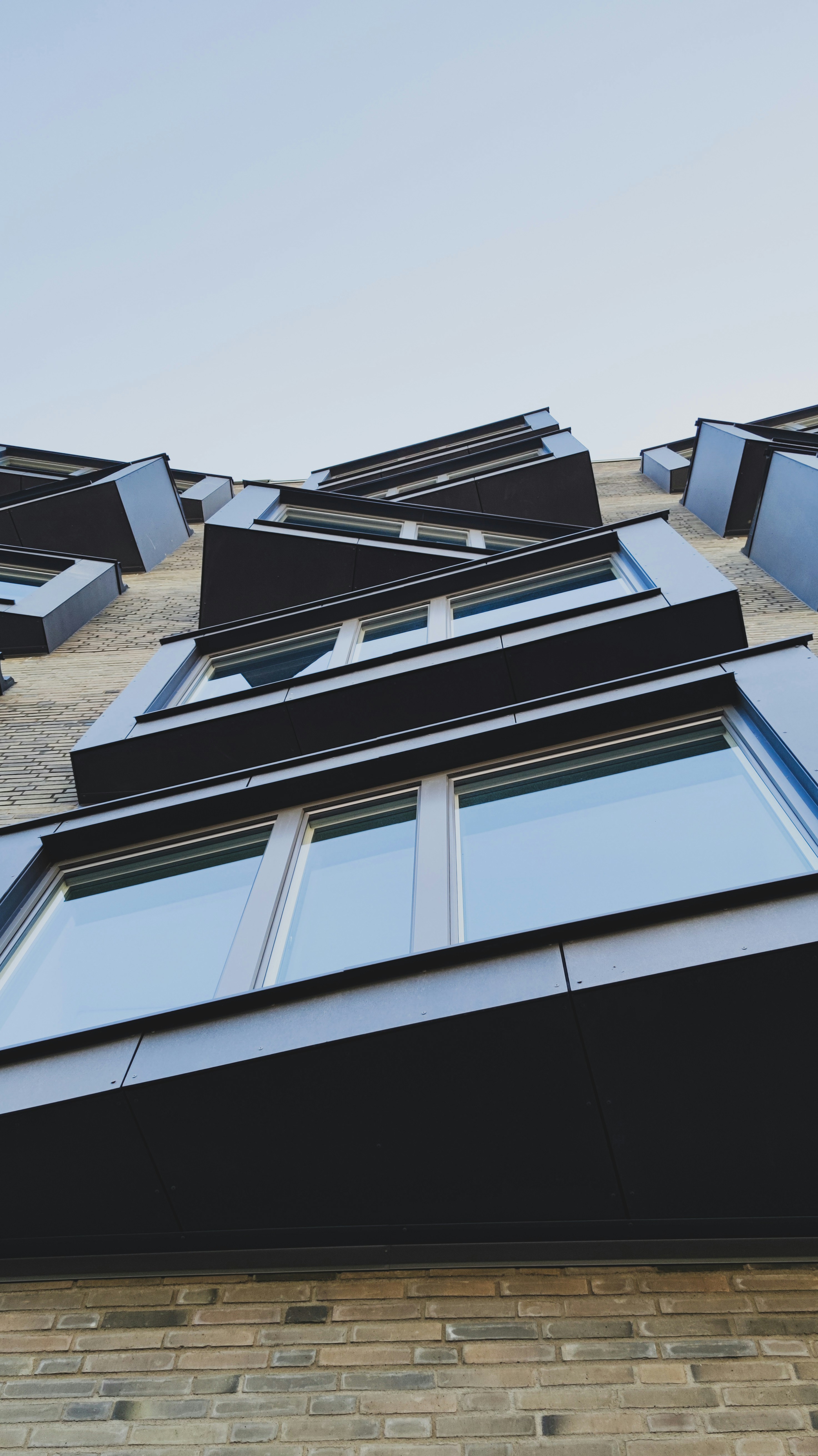 A tall building with lots of windows on top of it photo – Free Västerås ...