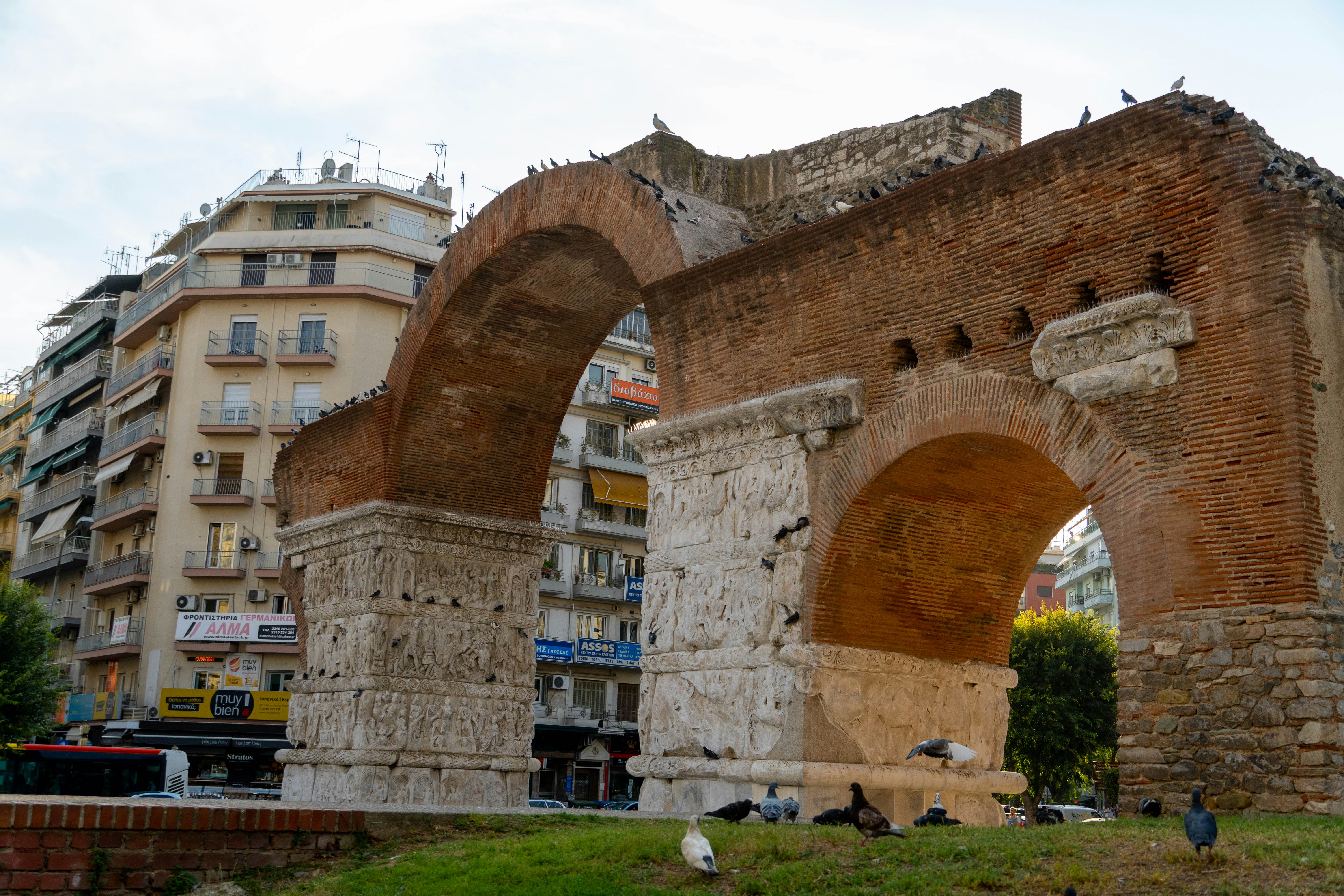 Time-Worn Arches Over a Lively City Street