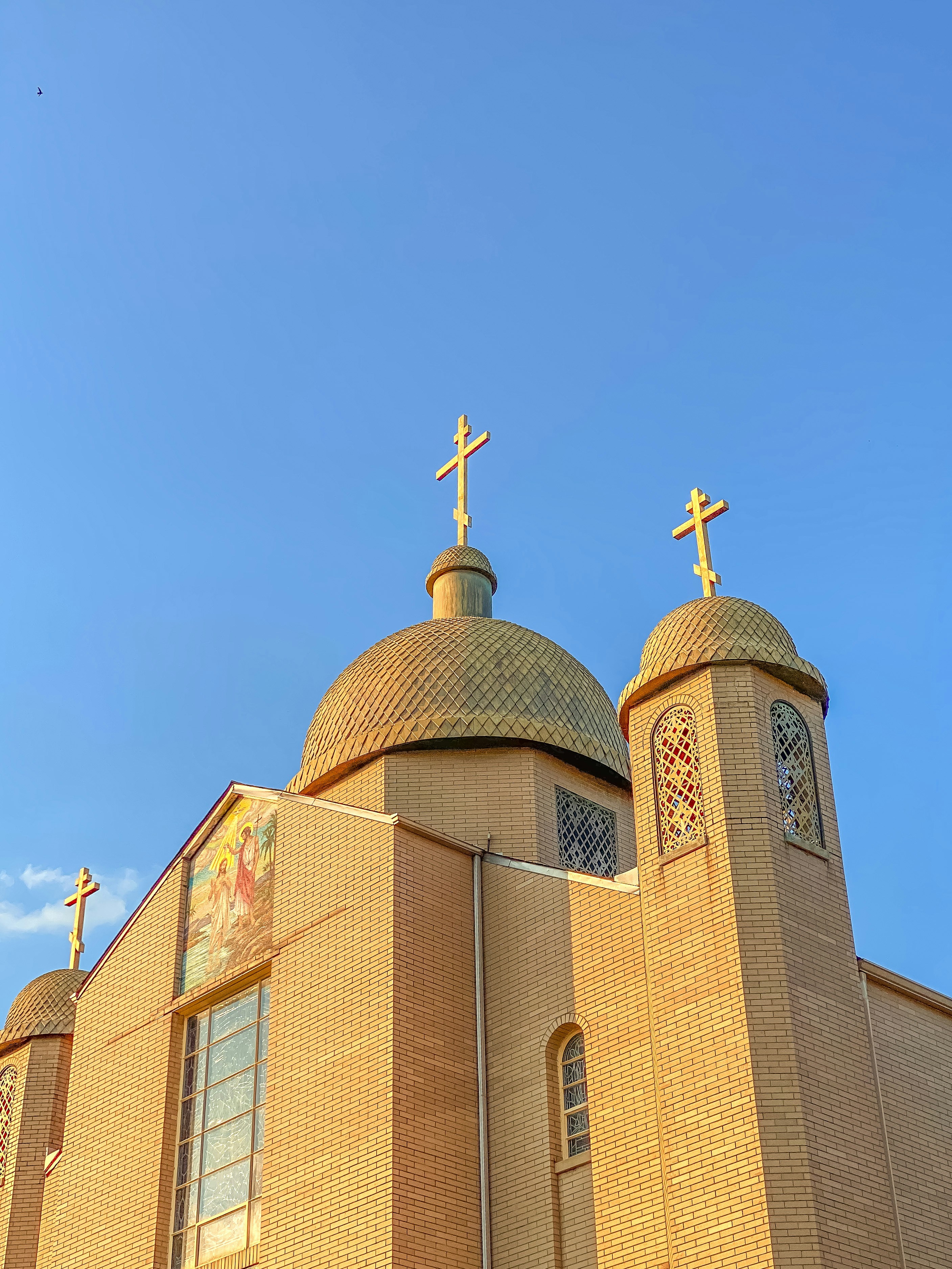 Orthodox church domes and crosses in the sun | a church with a cross on the top of it