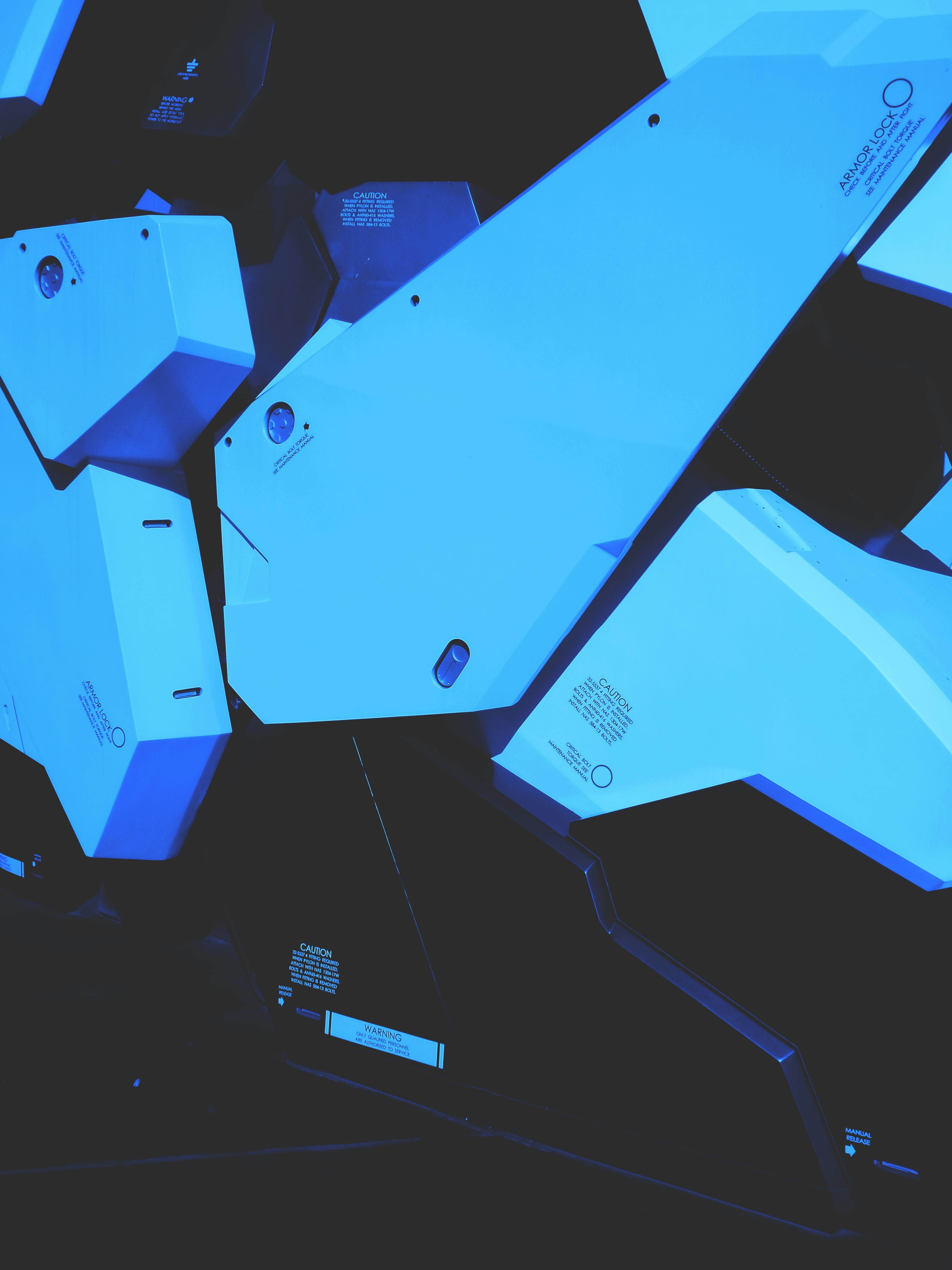 A close up of a blue object with a black background photo – Free Art ...