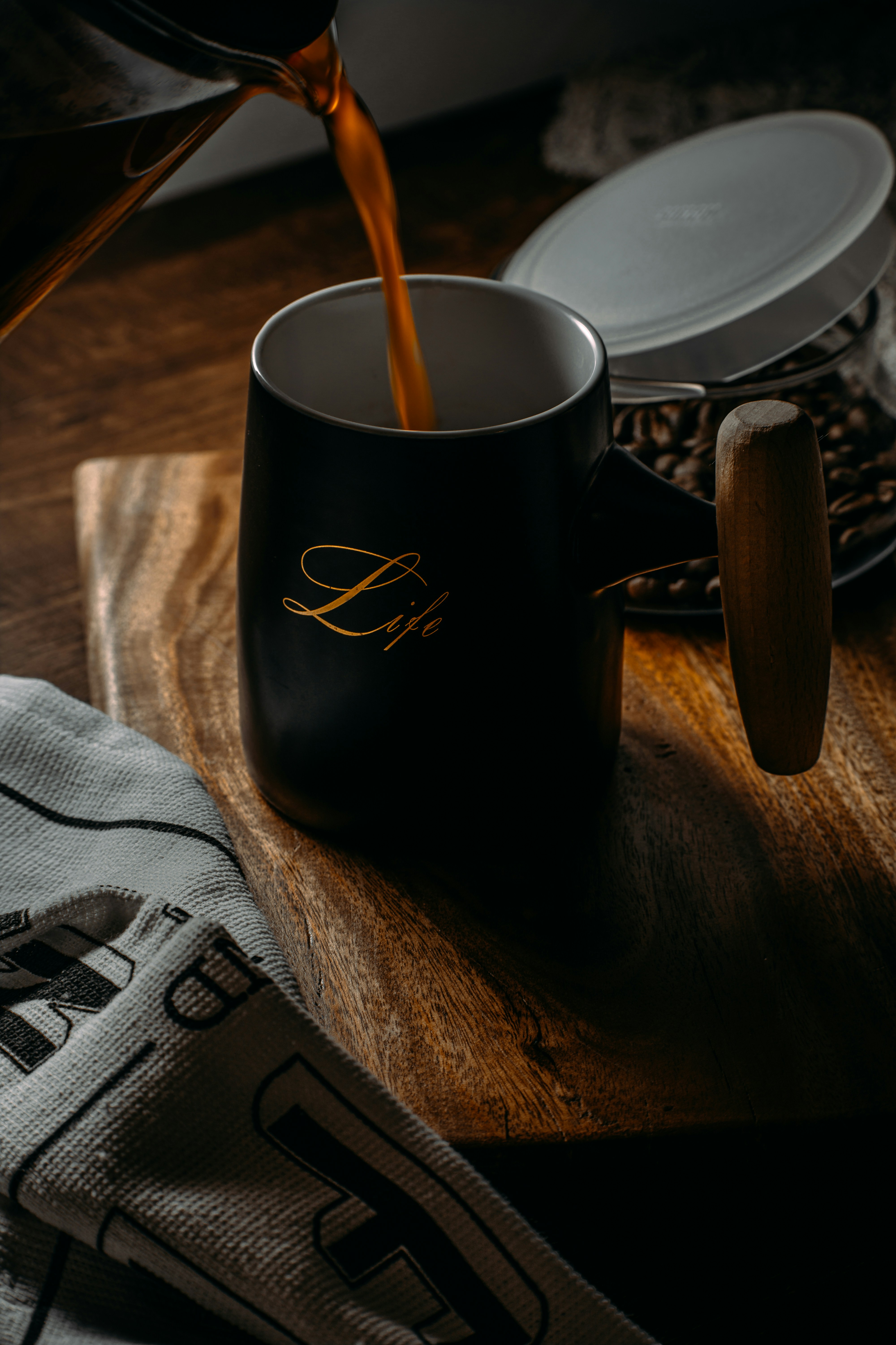 Gold Script Pour: A Quiet Moment with Coffee on Wood