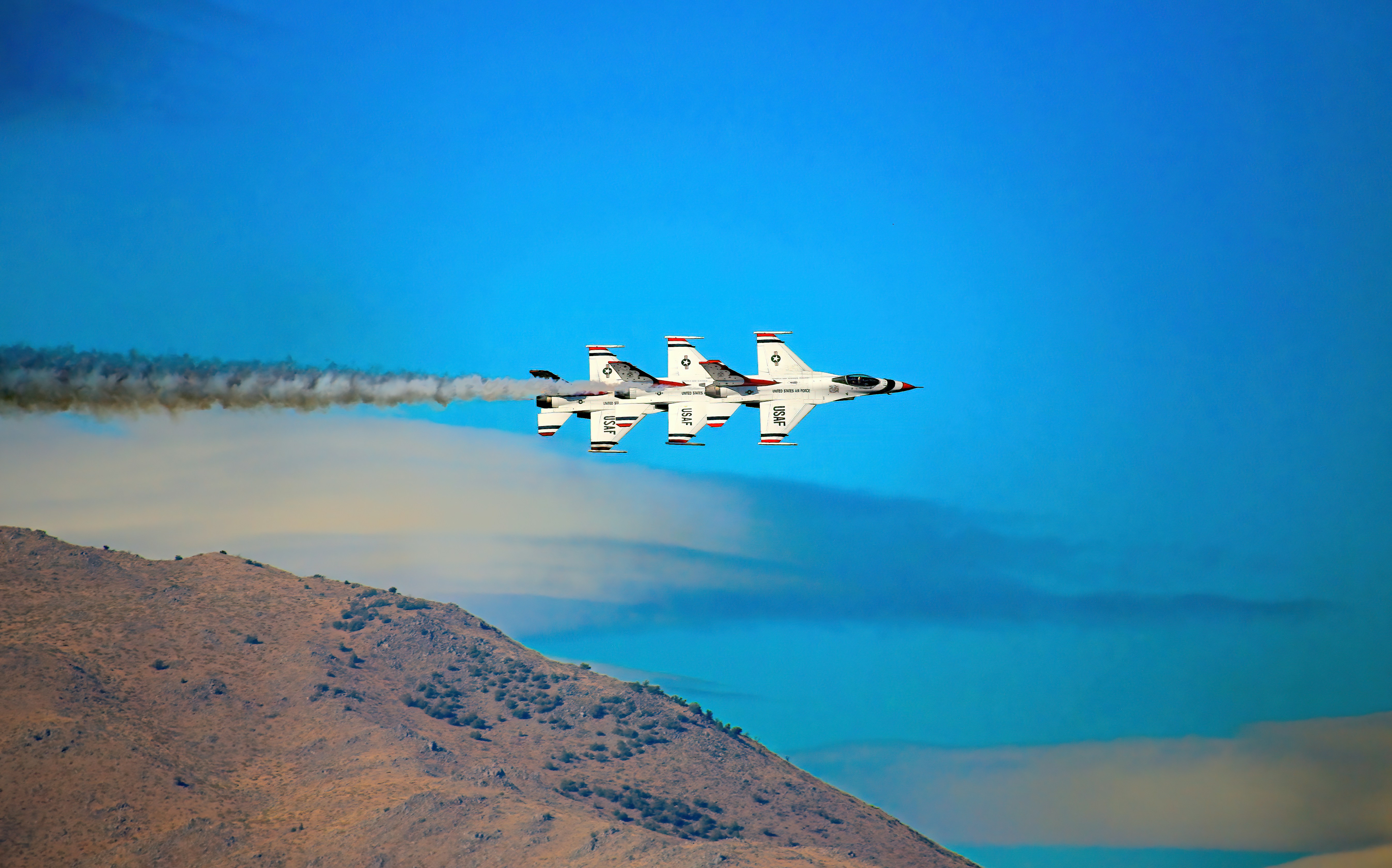 Two jets flying in the sky near a mountain photo – Free Reno Image on ...