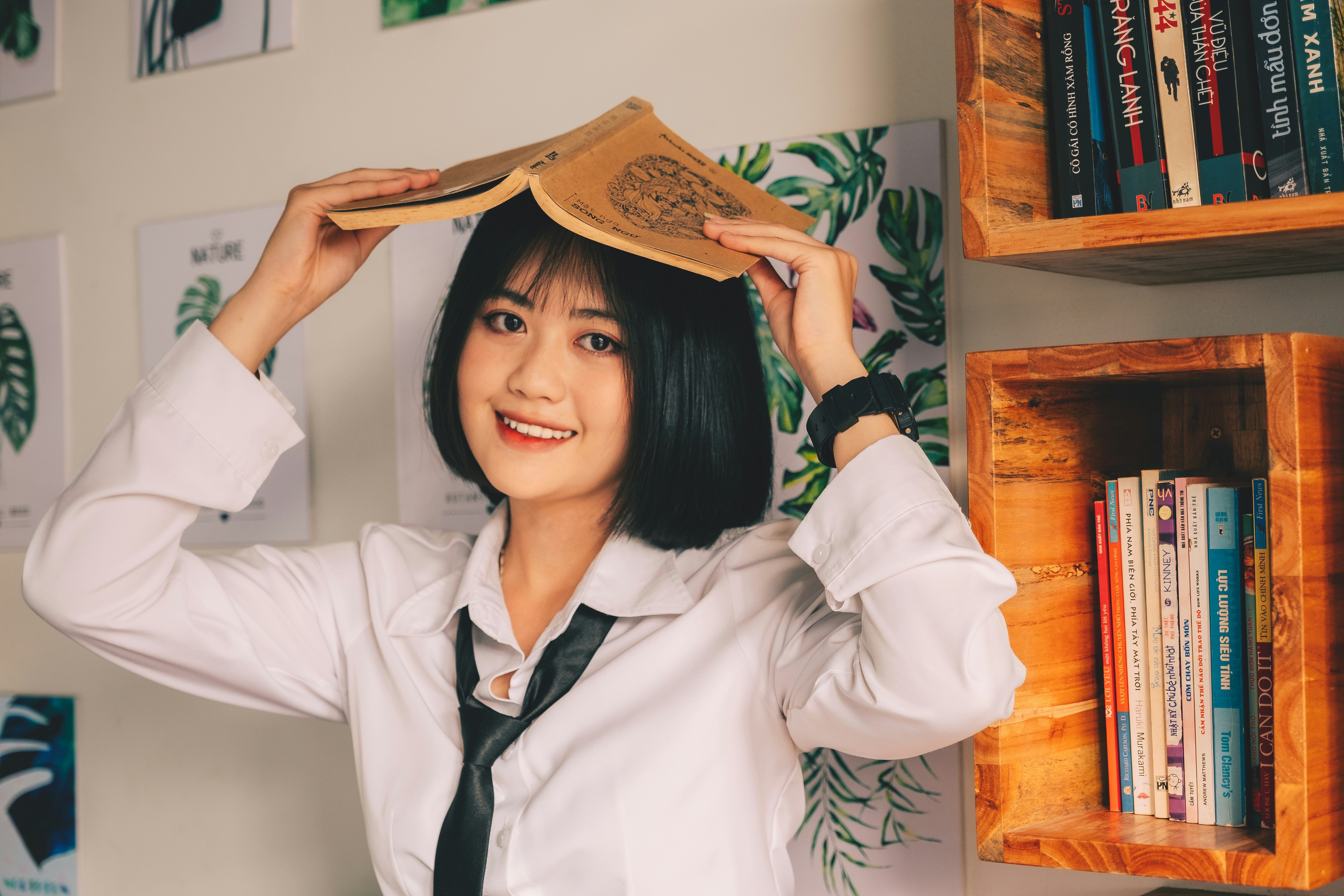 Playful Hat Trick: A bookish moment in a cozy library nook