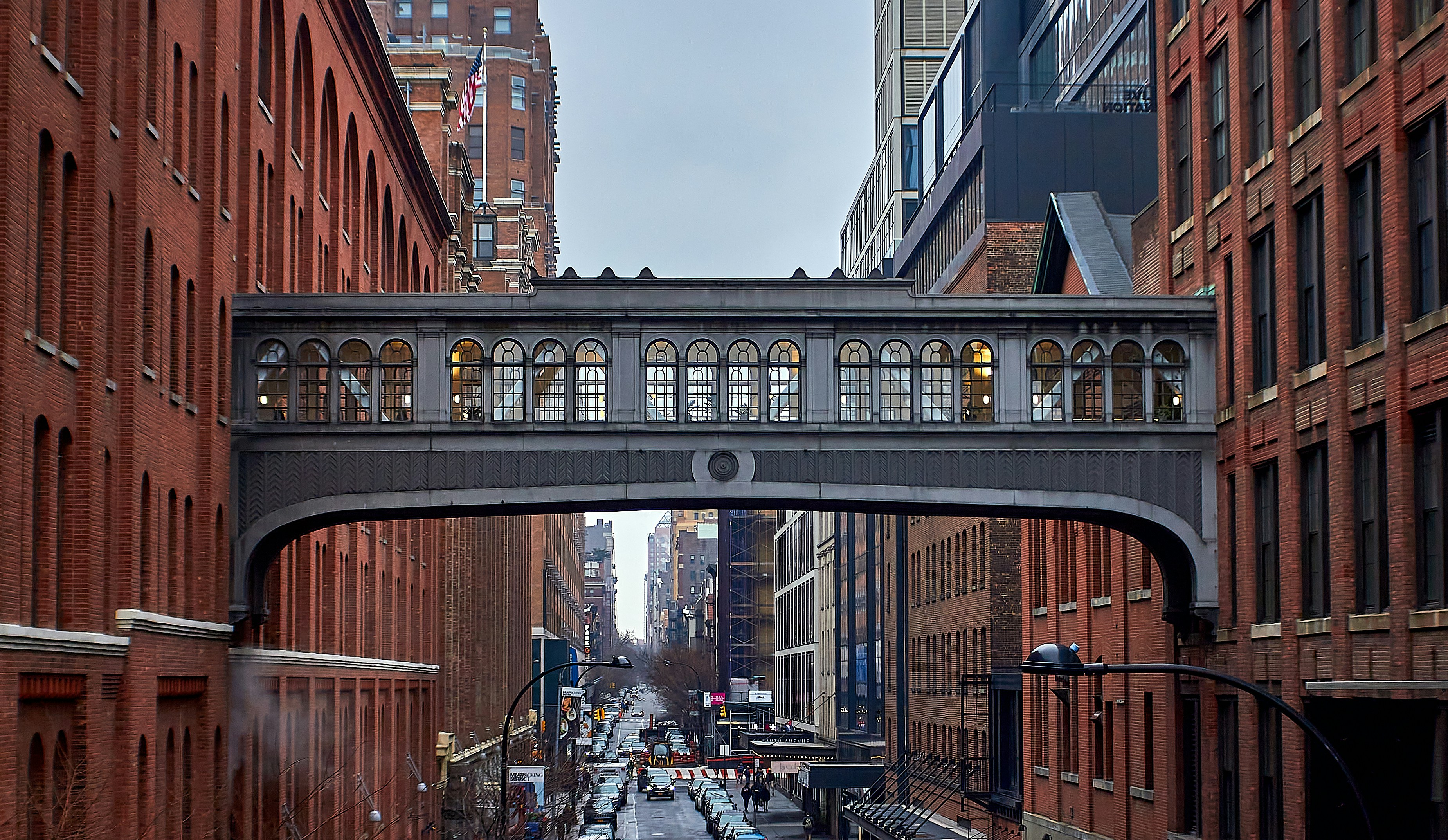 A bridge over a street in a city photo – Free Street Image on Unsplash