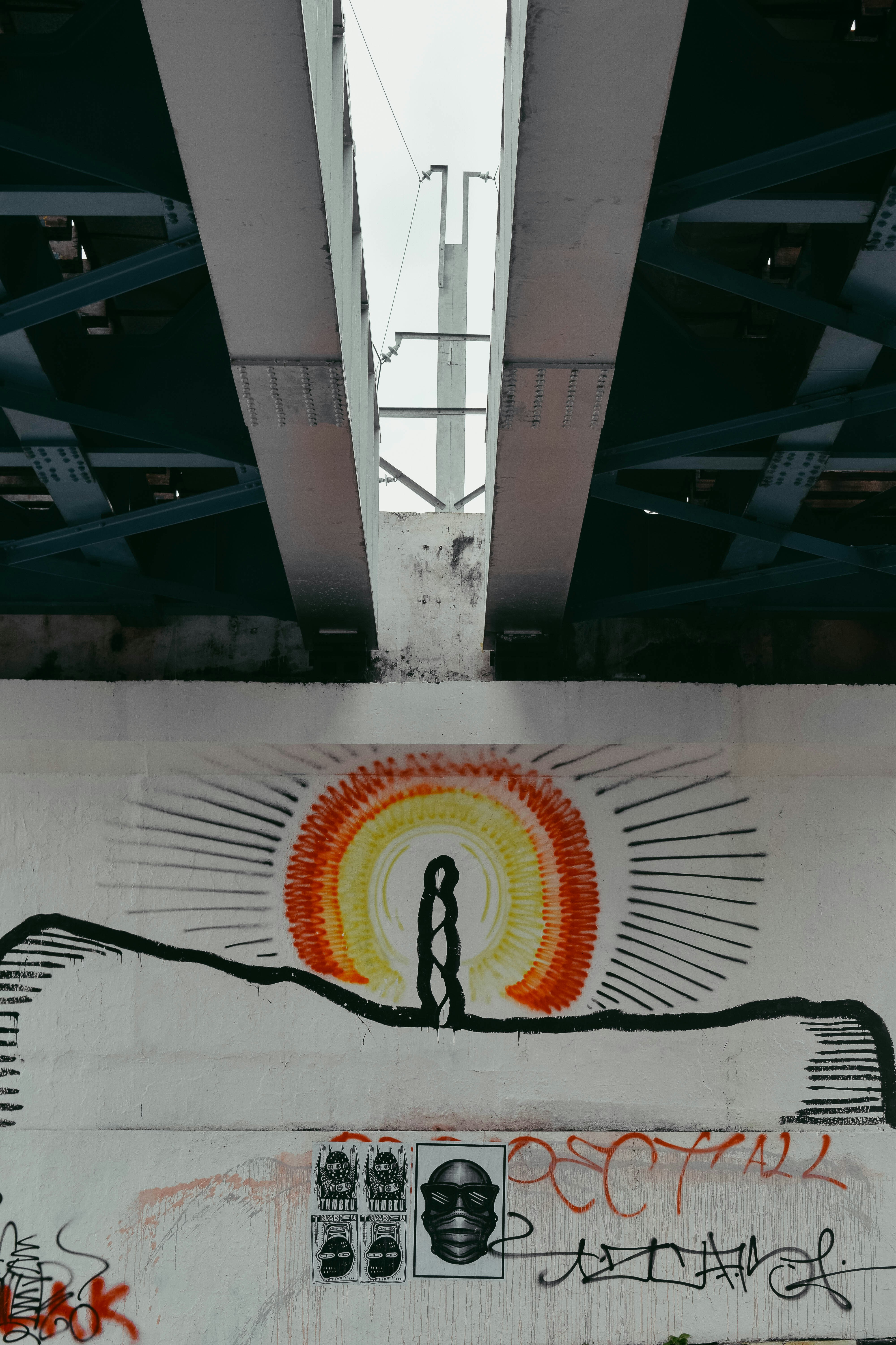 Sunrise Halo over Concrete Graffiti