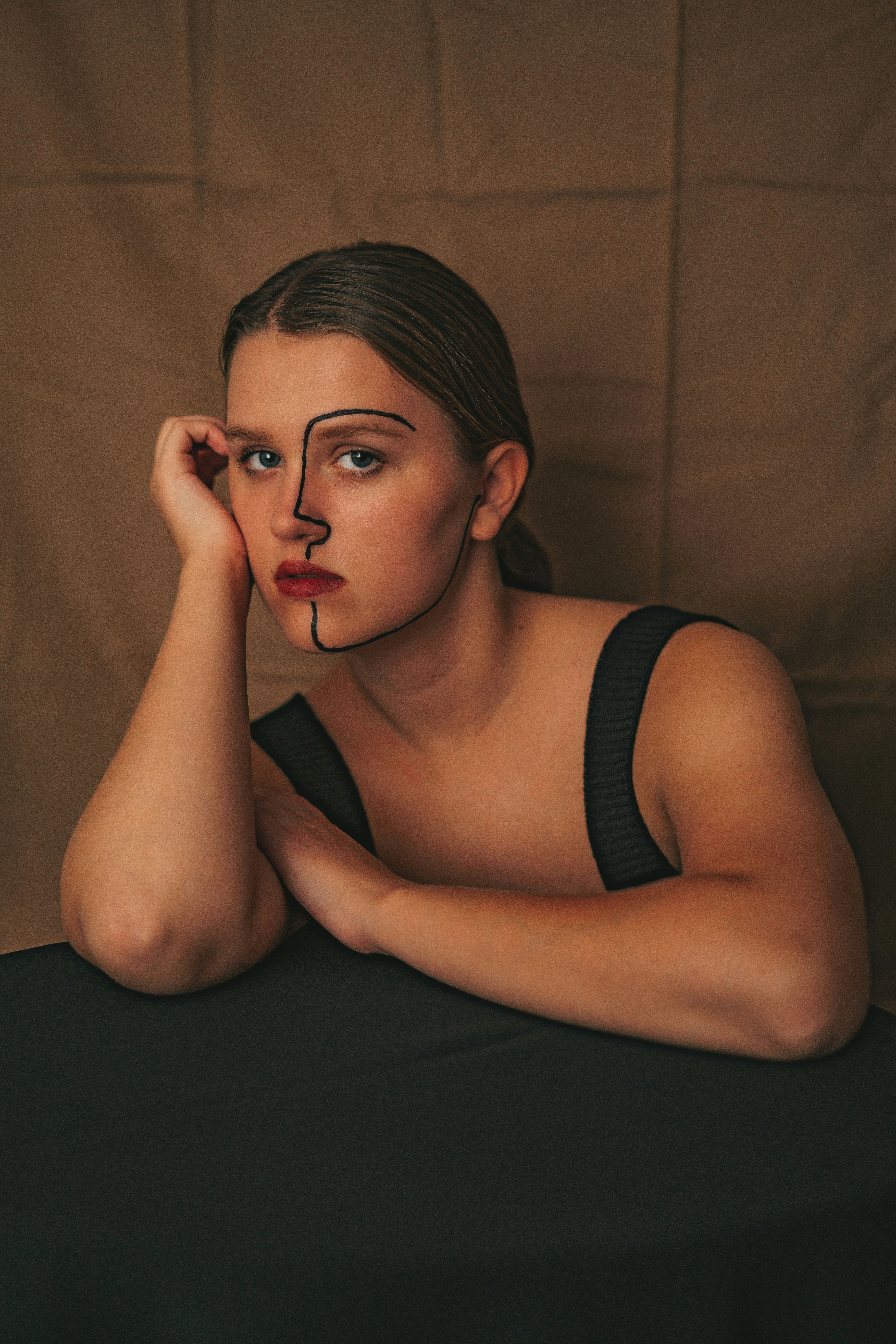 A woman with a fake nose and nose ring photo – Free Portrait Image on ...