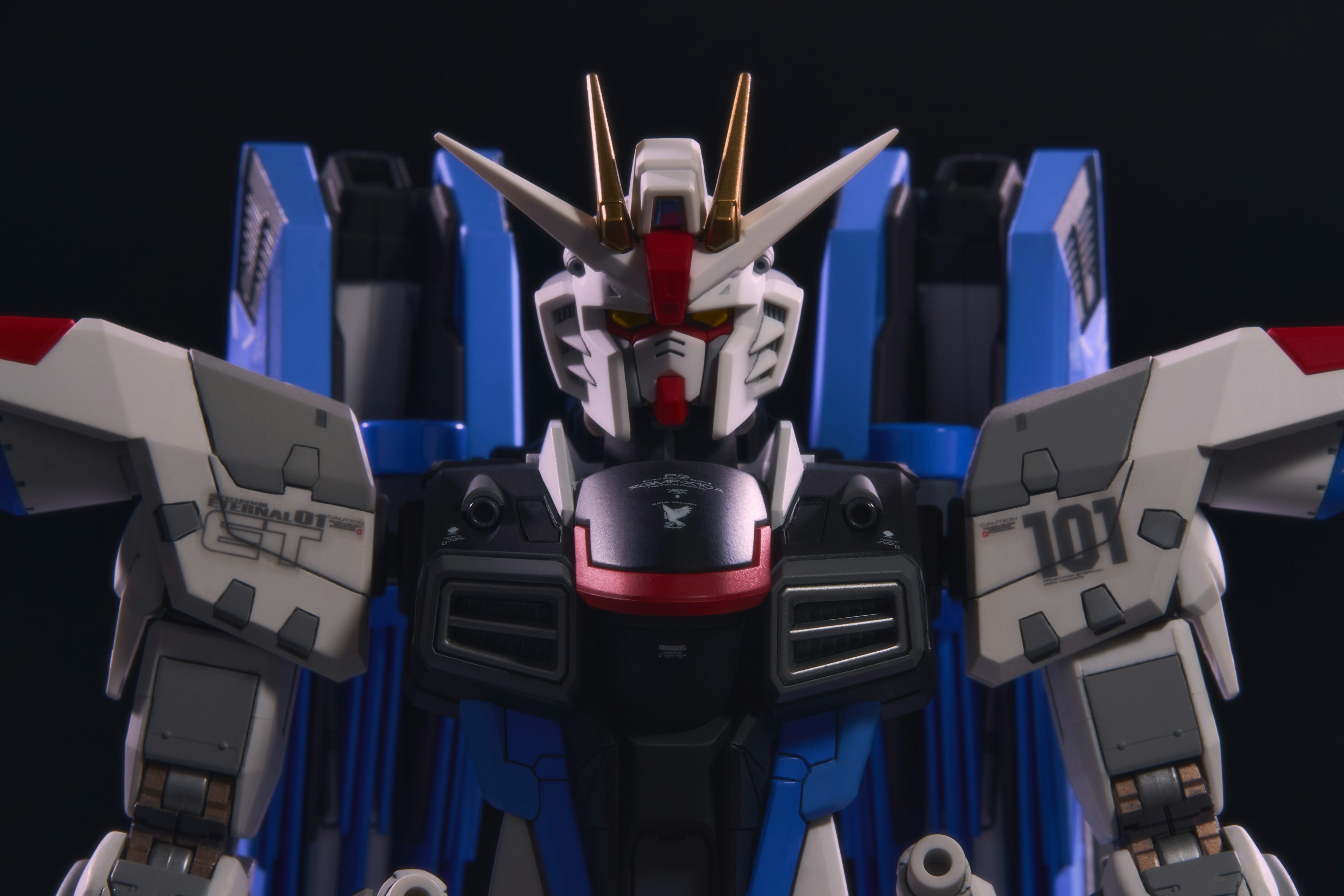 a close up of a robot that is on a black background