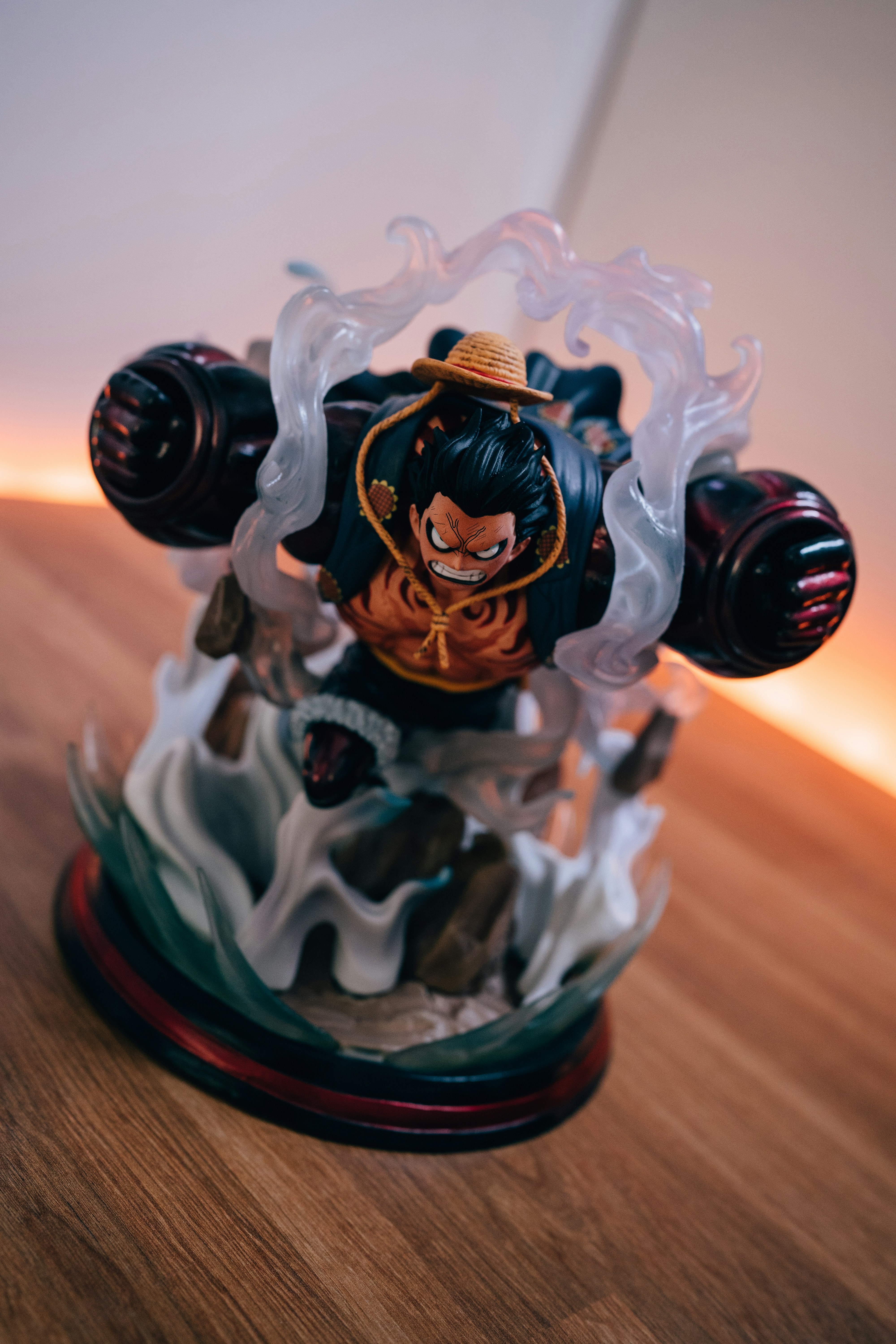 A figurine of a person on a fire hydrant photo – Free Human Image on ...