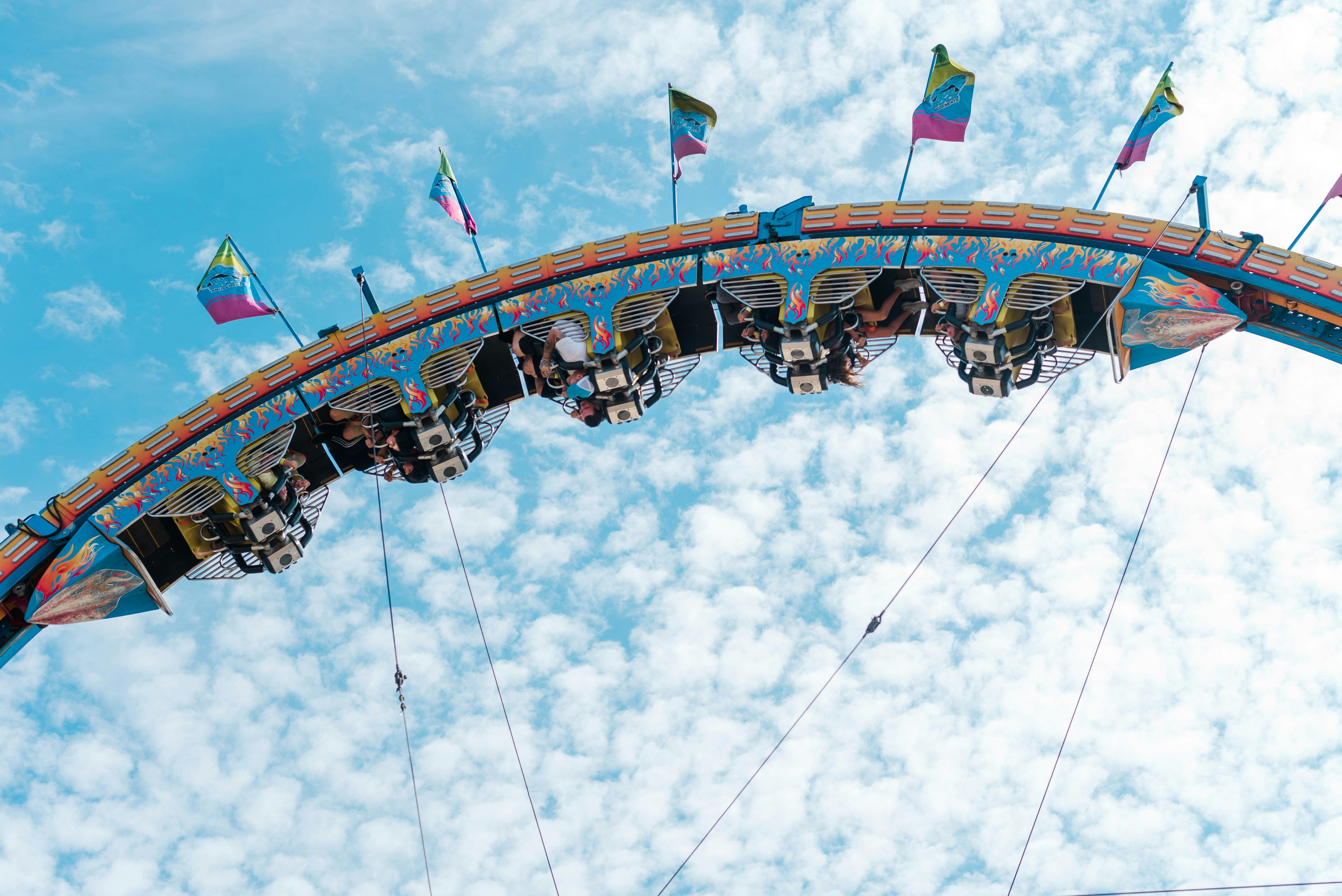 a carnival ride with people riding on it