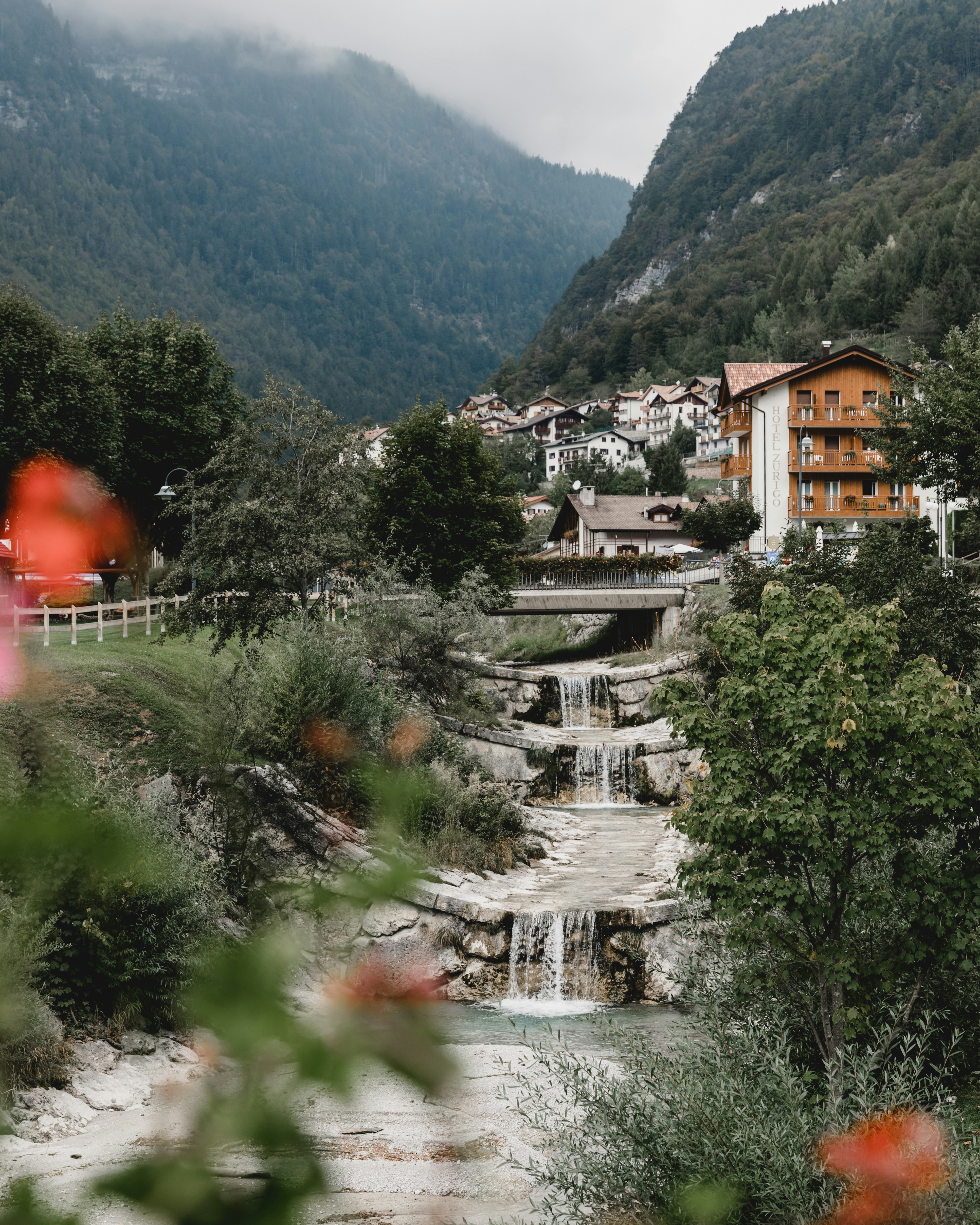 Cascade Steps Framing an Alpine Village