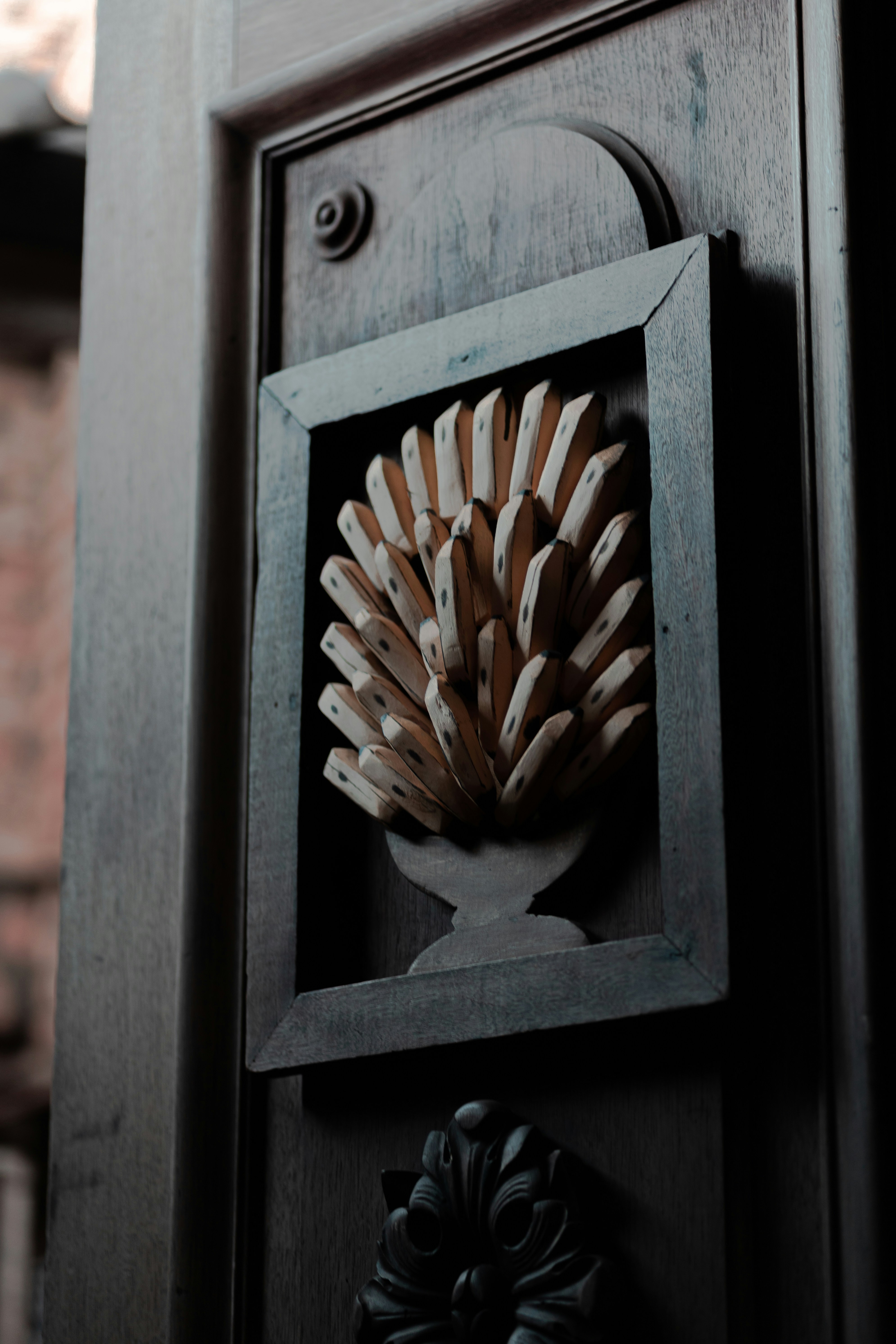 Hidden Florentine Gear: A Vintage Vent in Dark Wood
