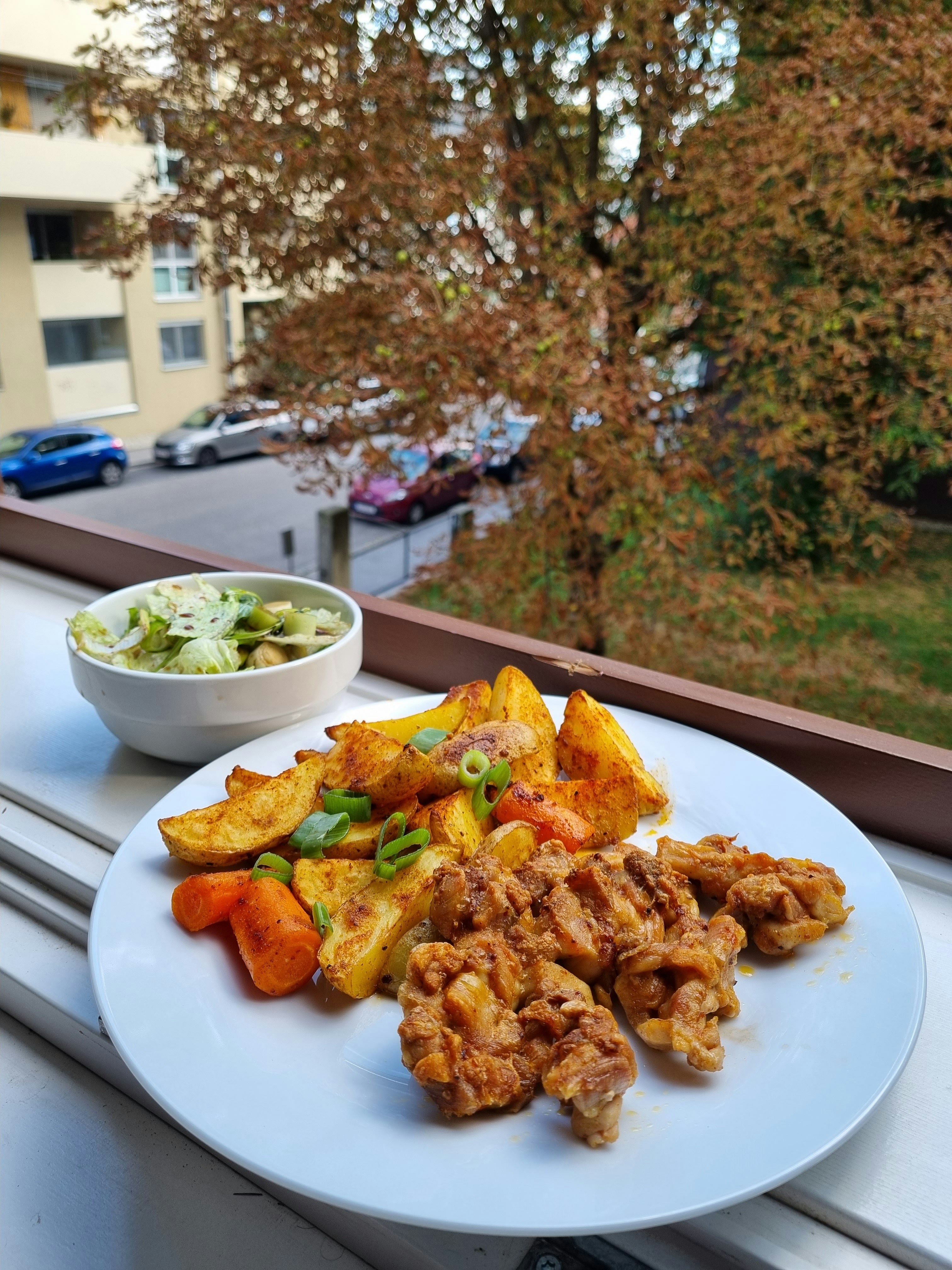 A plate of food sitting on a window sill photo – Free Austria Image on ...