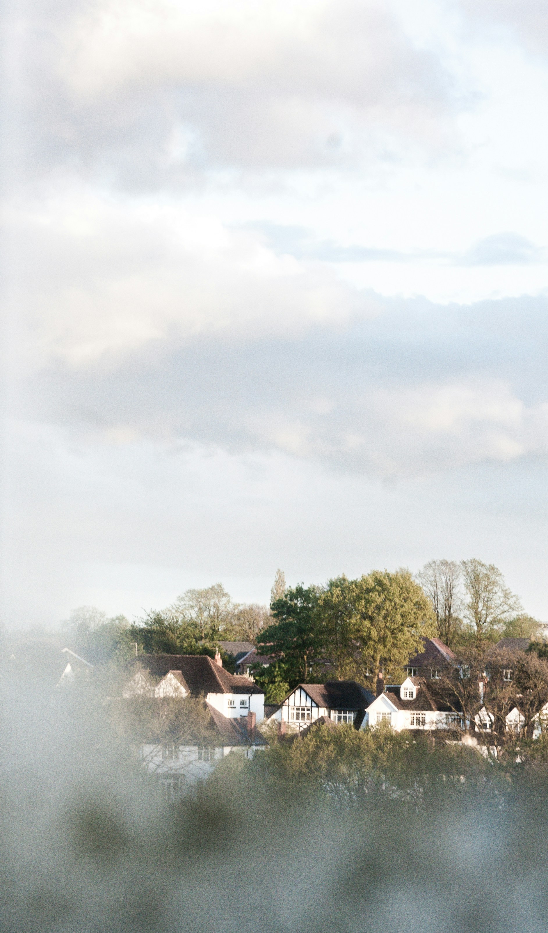 A view of a town through a window photo – Free Nature Image on Unsplash