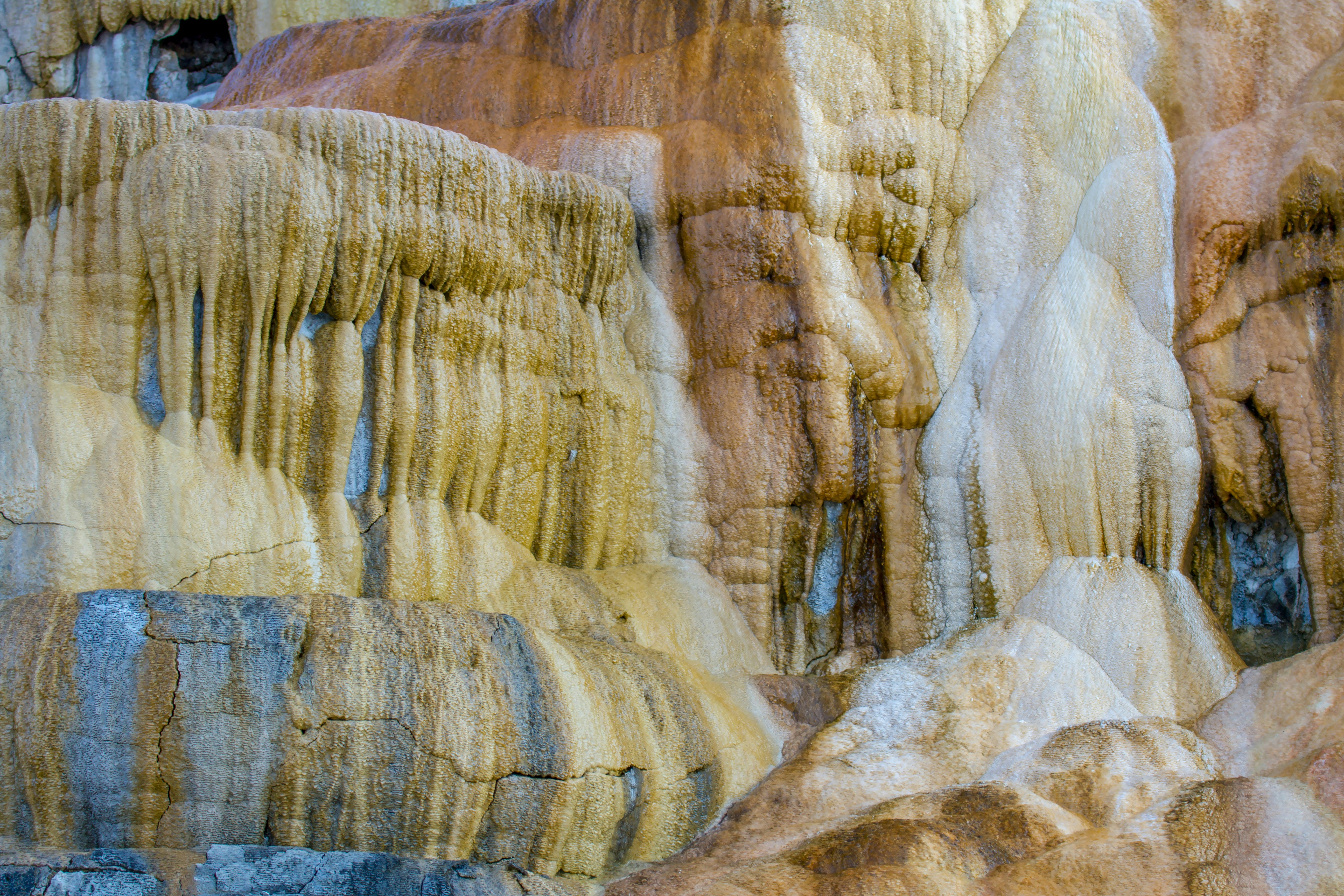 A large group of rocks that are very colorful photo – Free Yellowstone ...