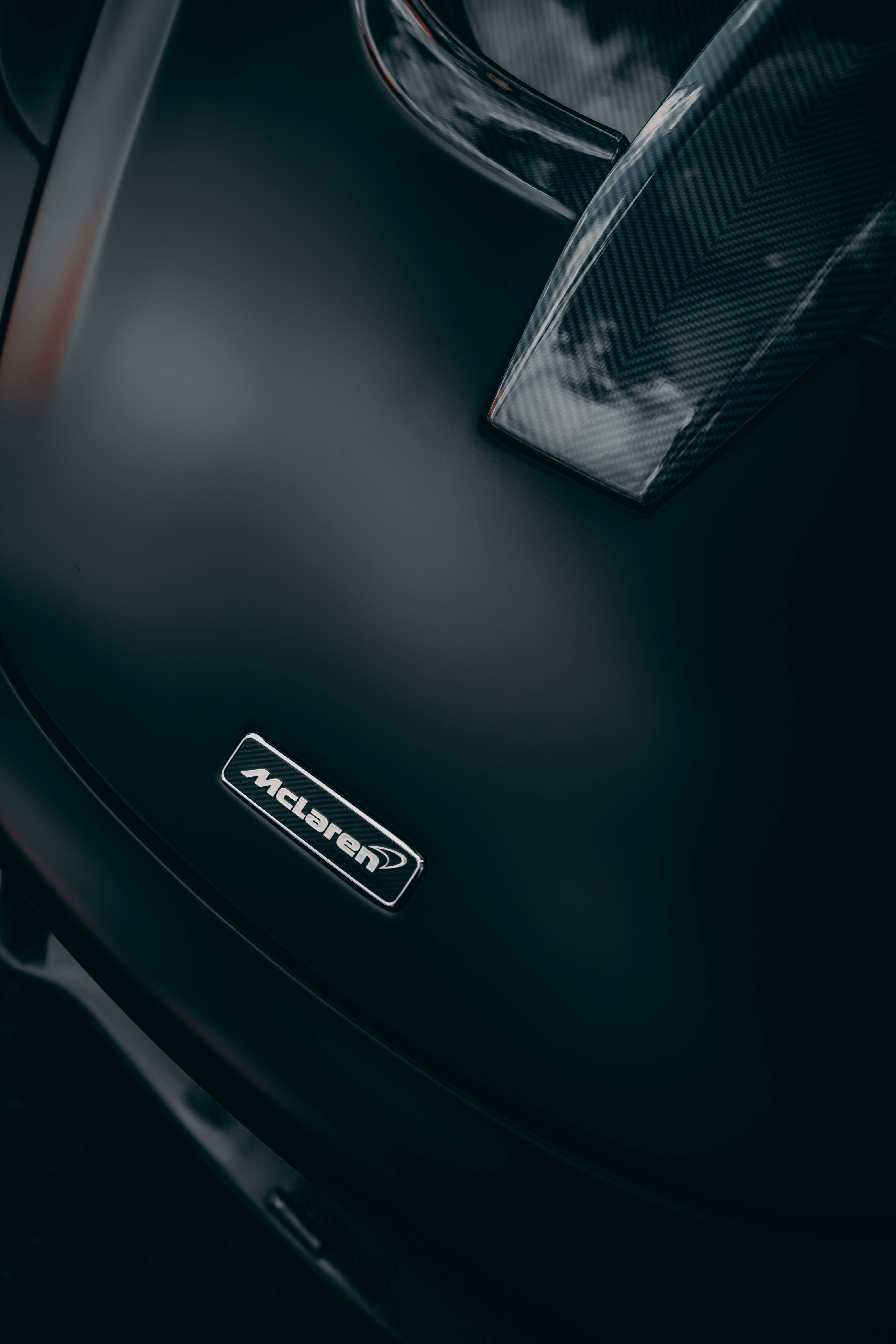 a close up of the front end of a sports car
