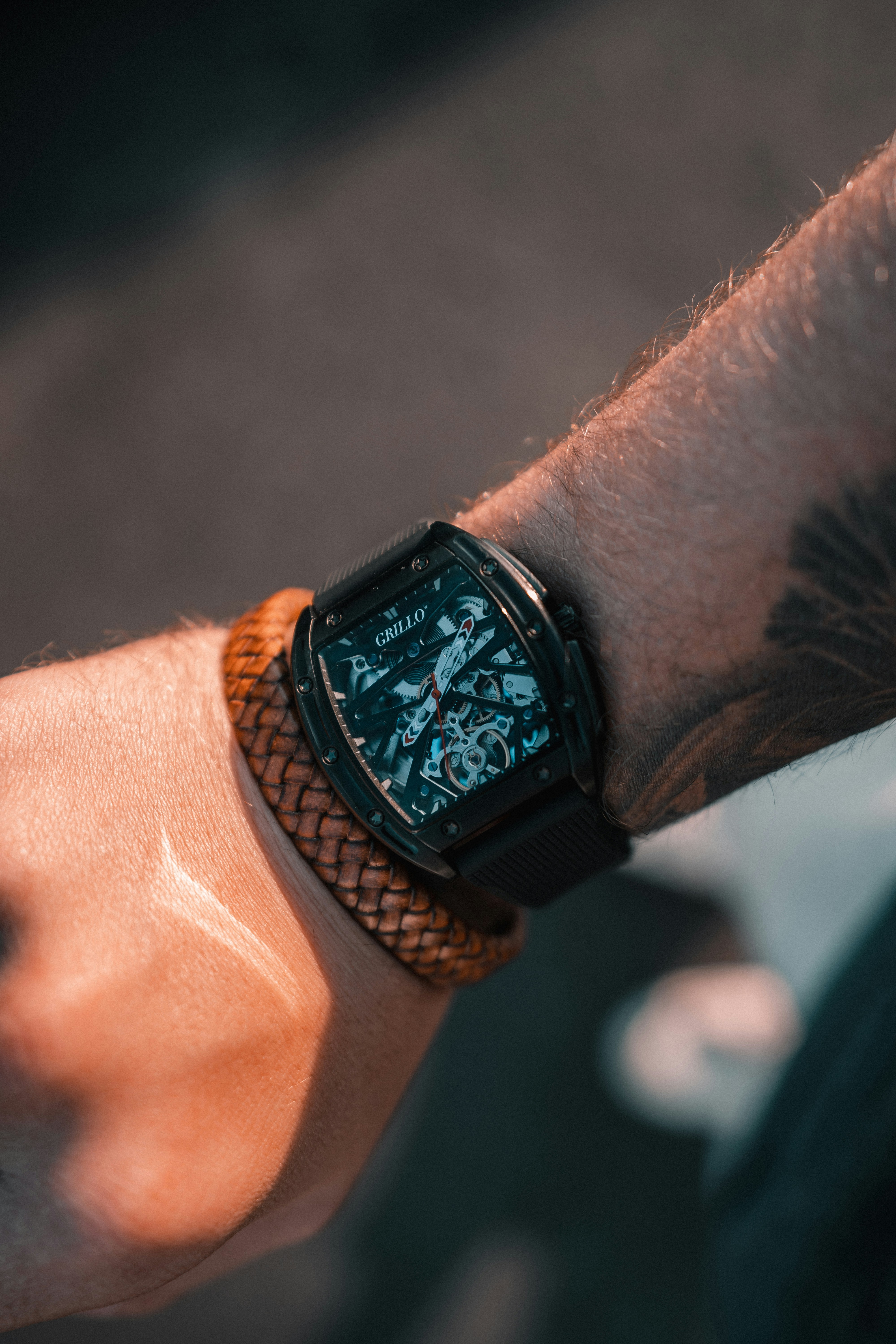 A close up of a person wearing a wrist watch photo – Free Grey Image on ...