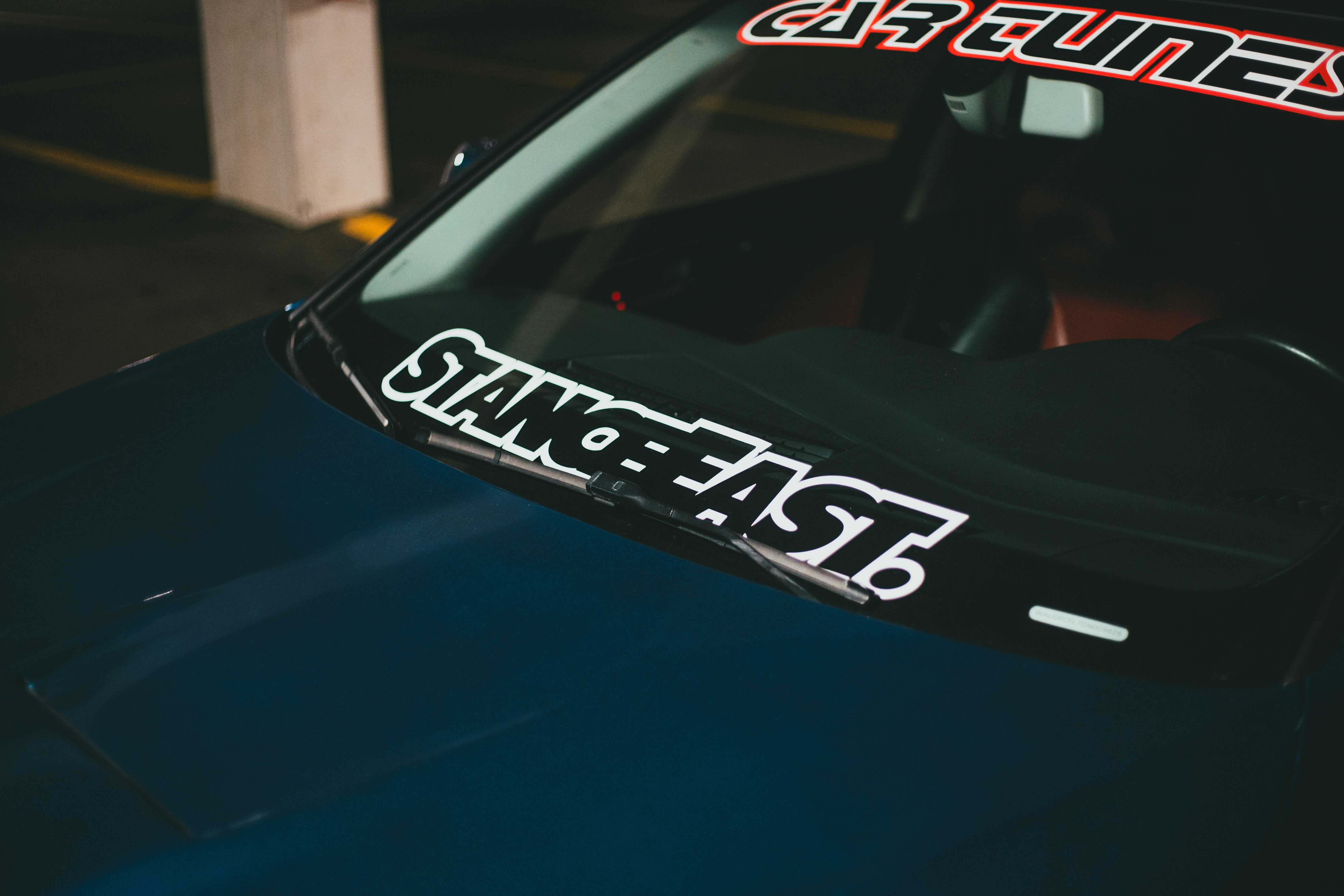 A close up of a car with a sticker on it photo – Free Car Image on Unsplash