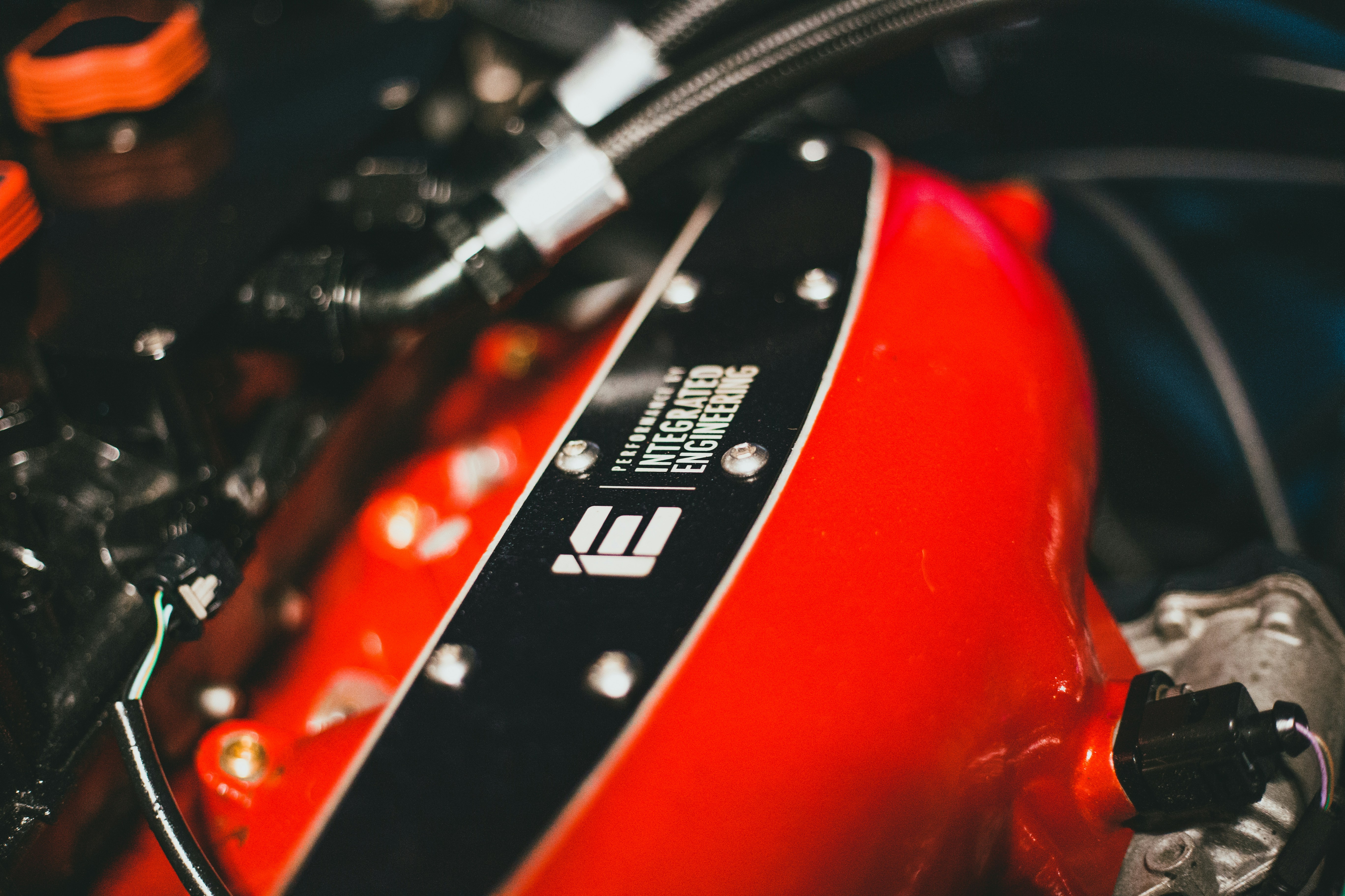 A close up of a red motorcycle engine photo – Free Red Image on Unsplash