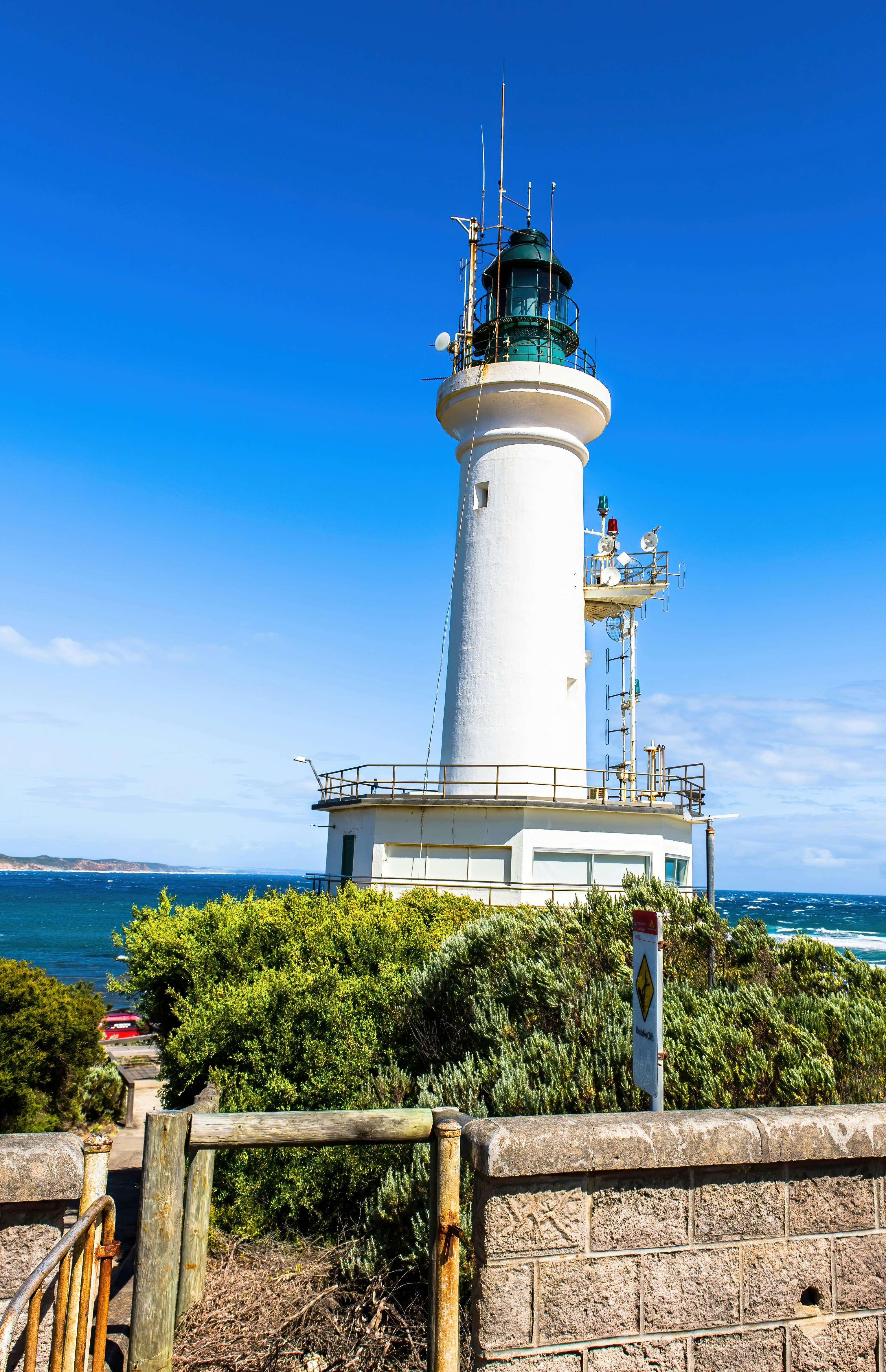 A bridge over a body of water photo – Free Point lonsdale lighthouse ...