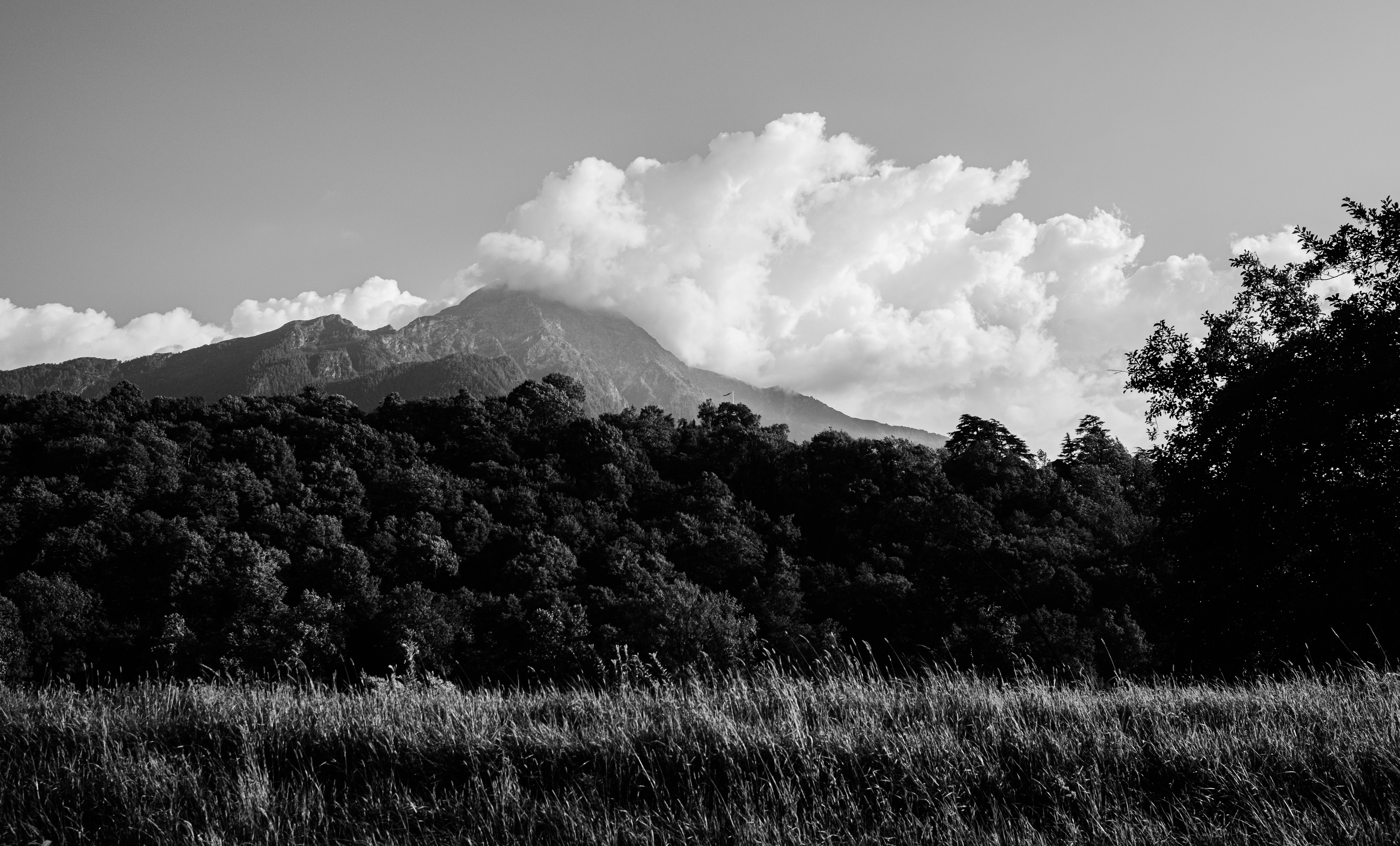Monochrome Serenity Over Mountain Silhouette