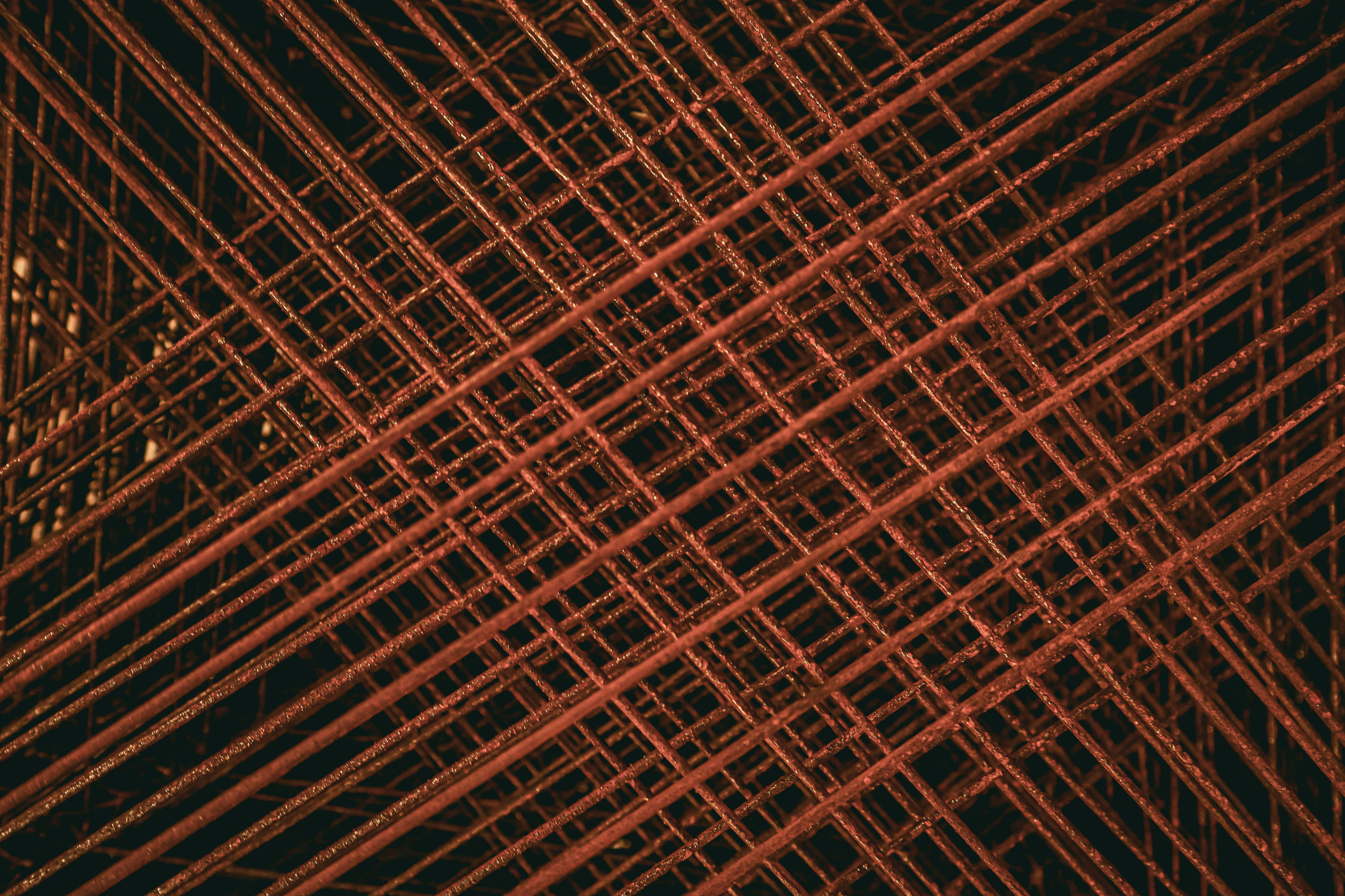A close up of a red wire structure photo – Free Texture Image on Unsplash