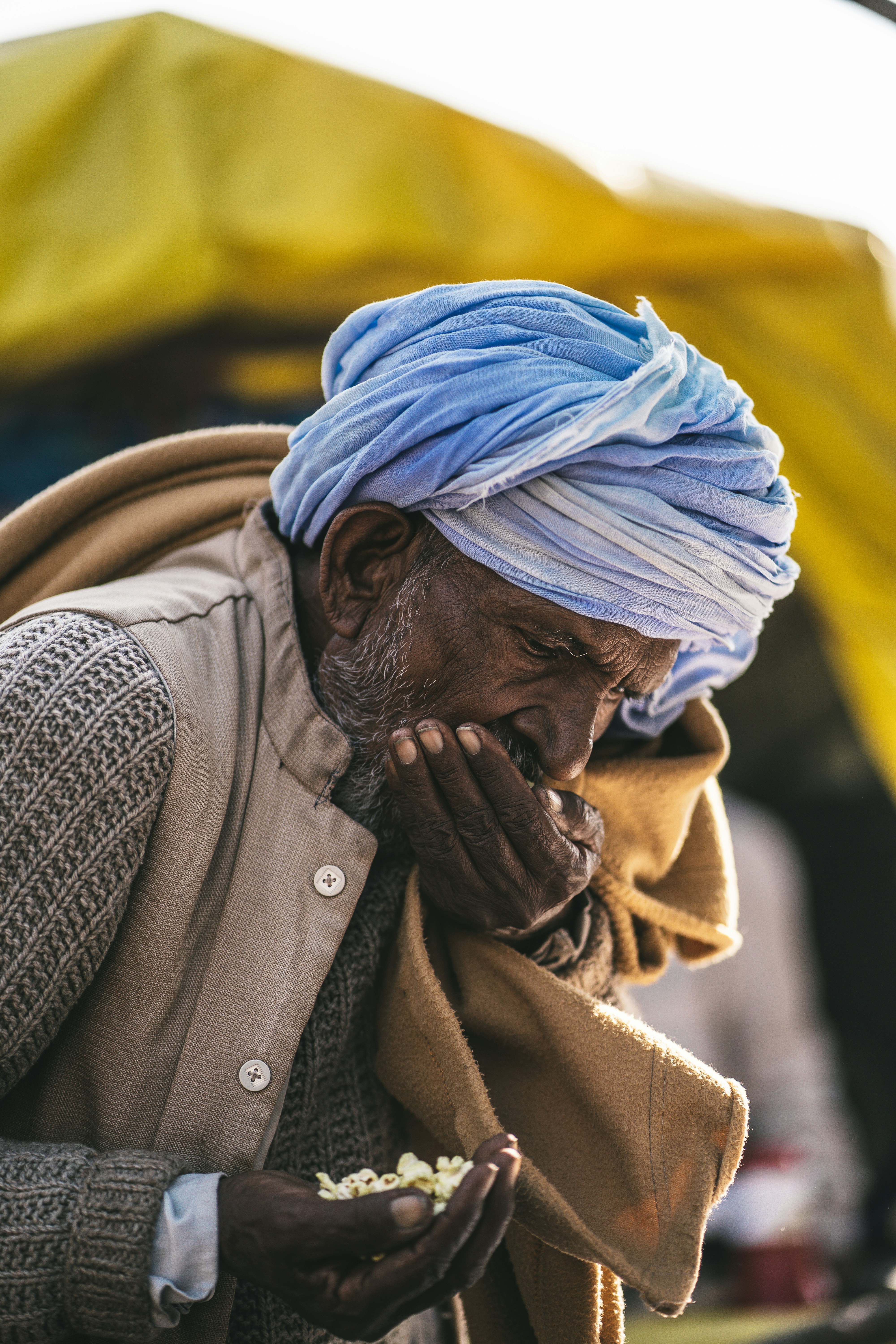 A man with a blue turban eating food photo – Free New delhi Image on ...