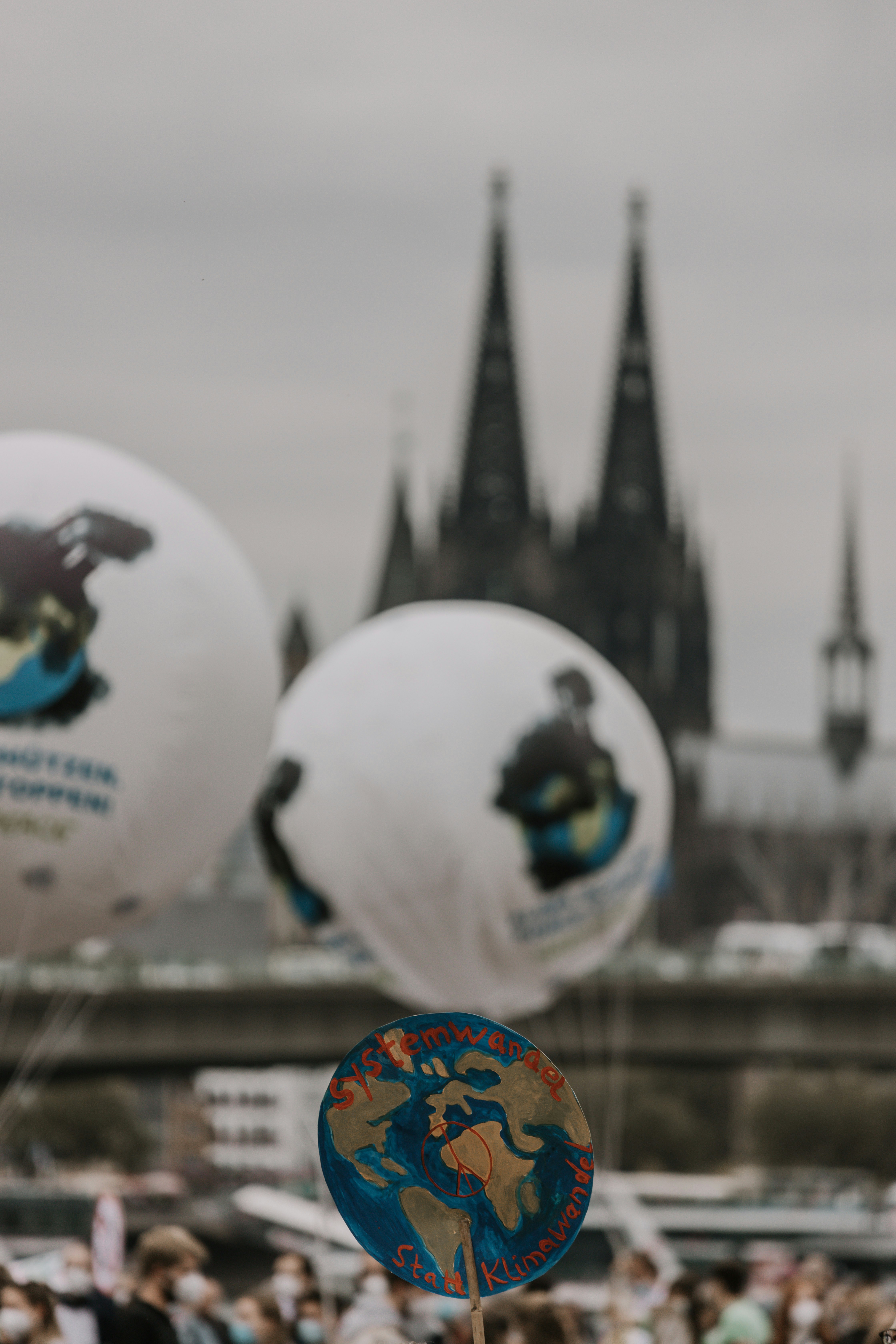 Global Climate Parade: Globe Balloon and Cathedral Silhouettes
