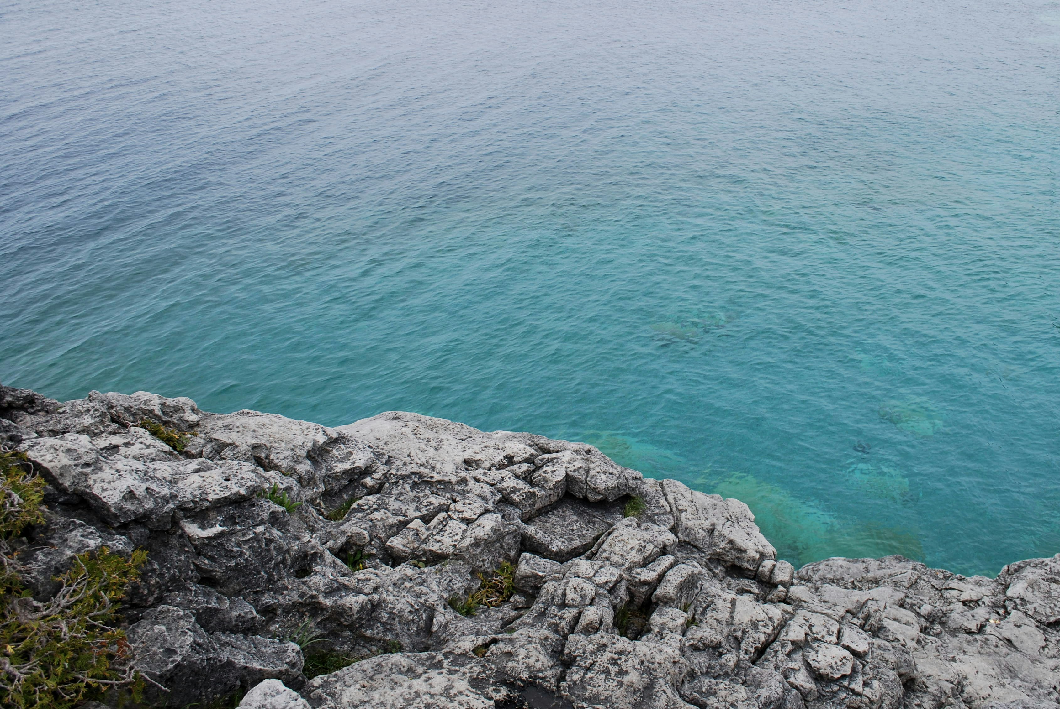 A view of a body of water from a cliff photo – Free The grotto Image on ...