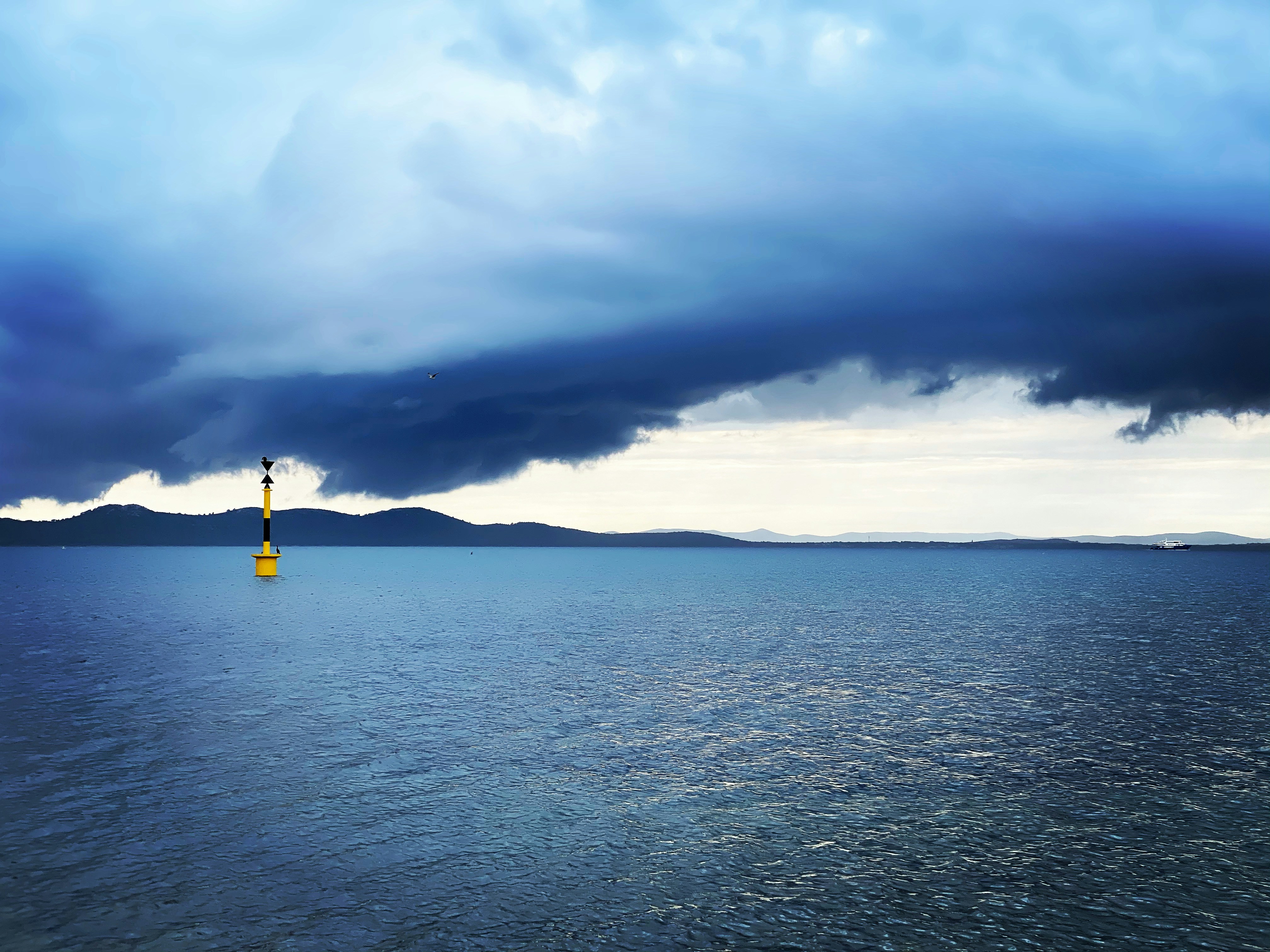 Approaching Storm Over Tranquil Waters