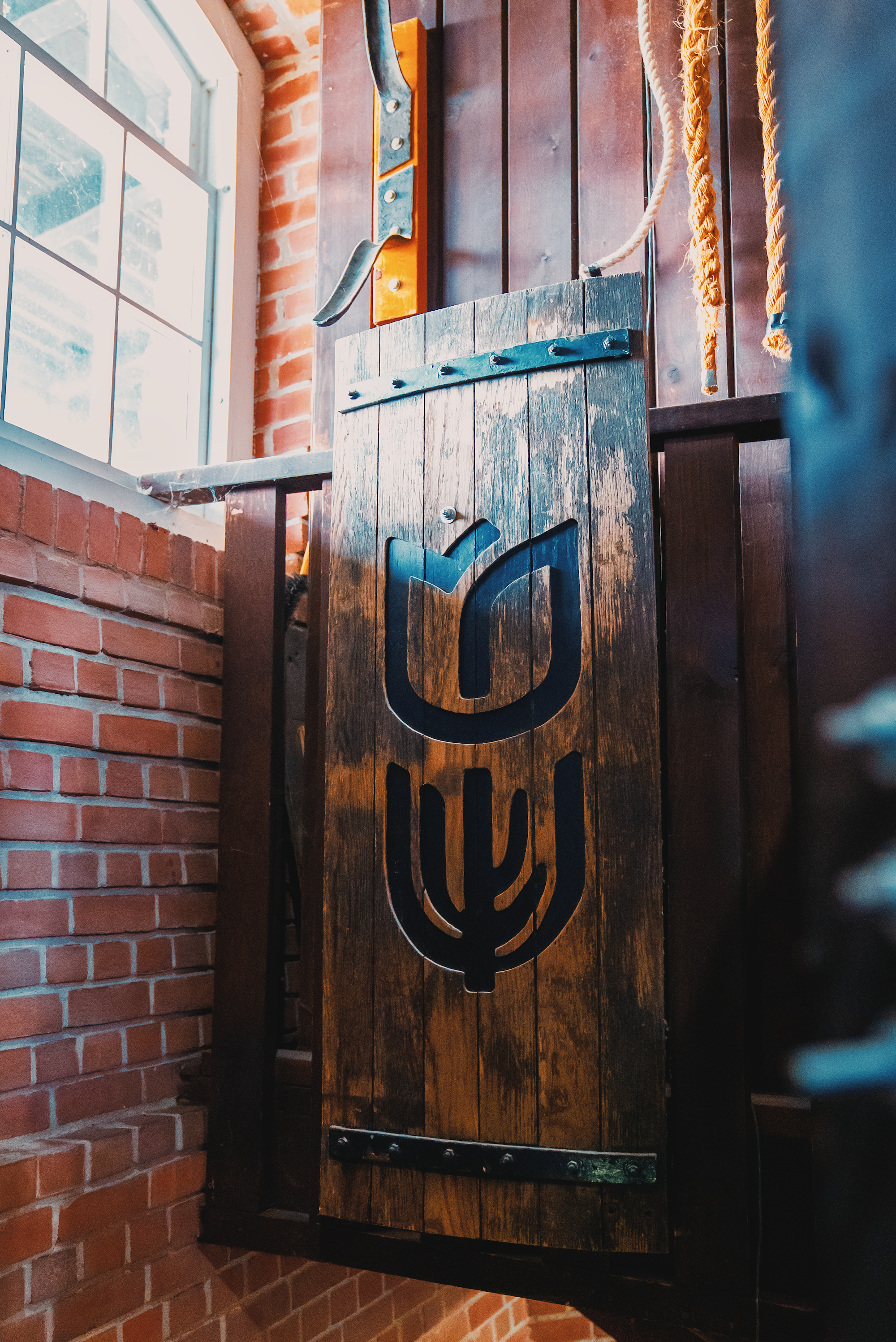 Weathered Timber Emblem: A Quiet Corner of a Rustic Workshop