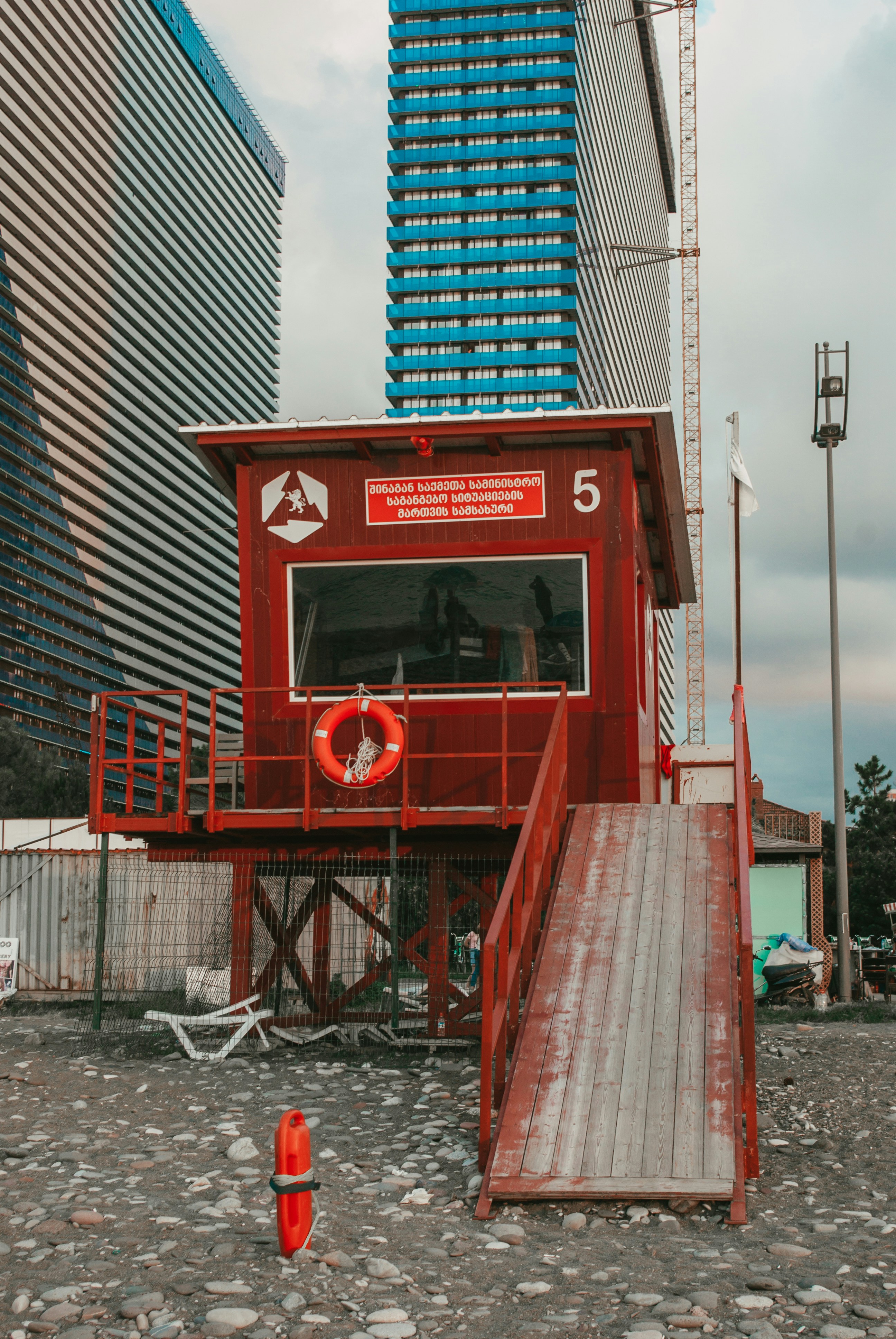 a red building with a ramp leading up to it