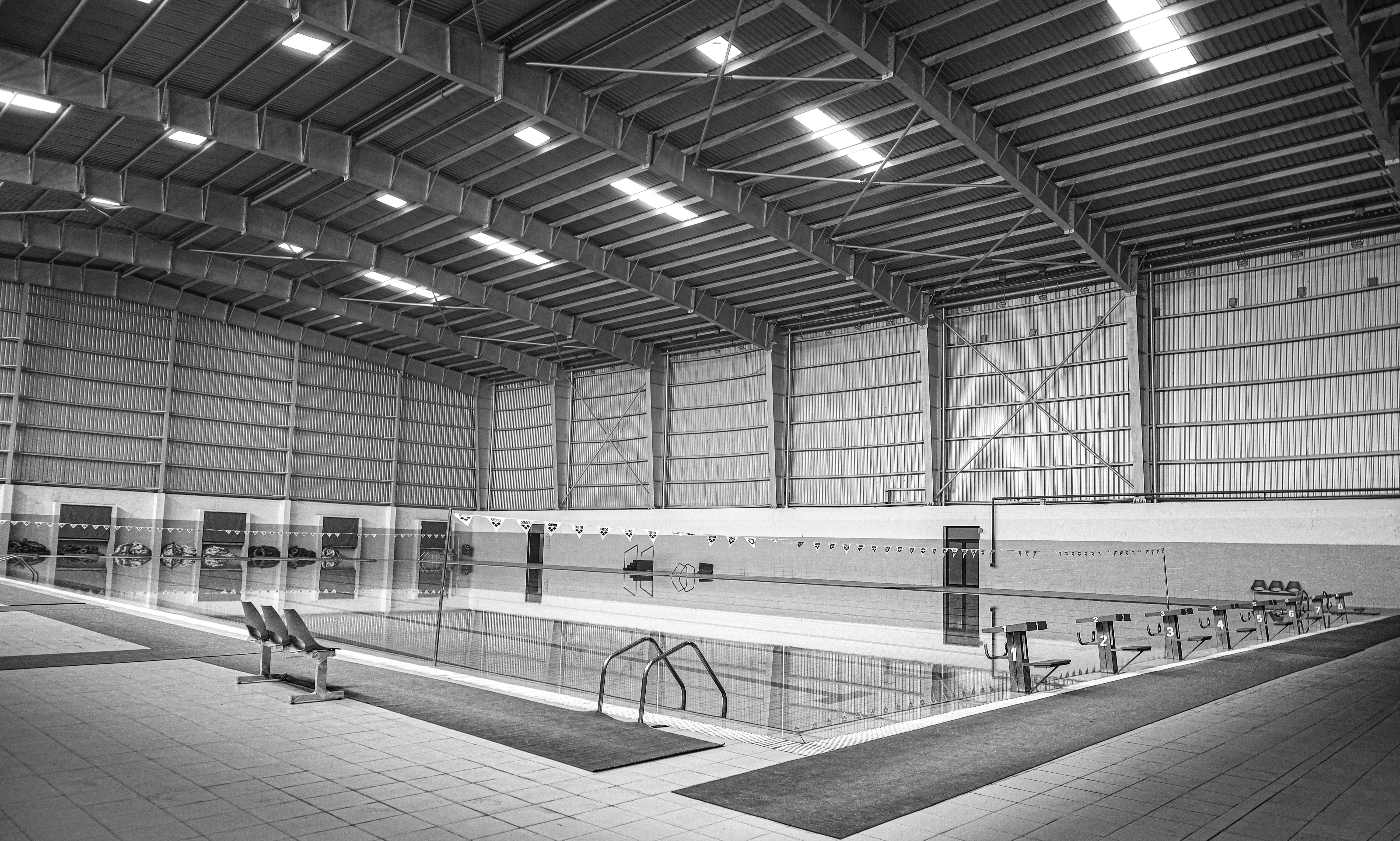 a large indoor swimming pool in a building