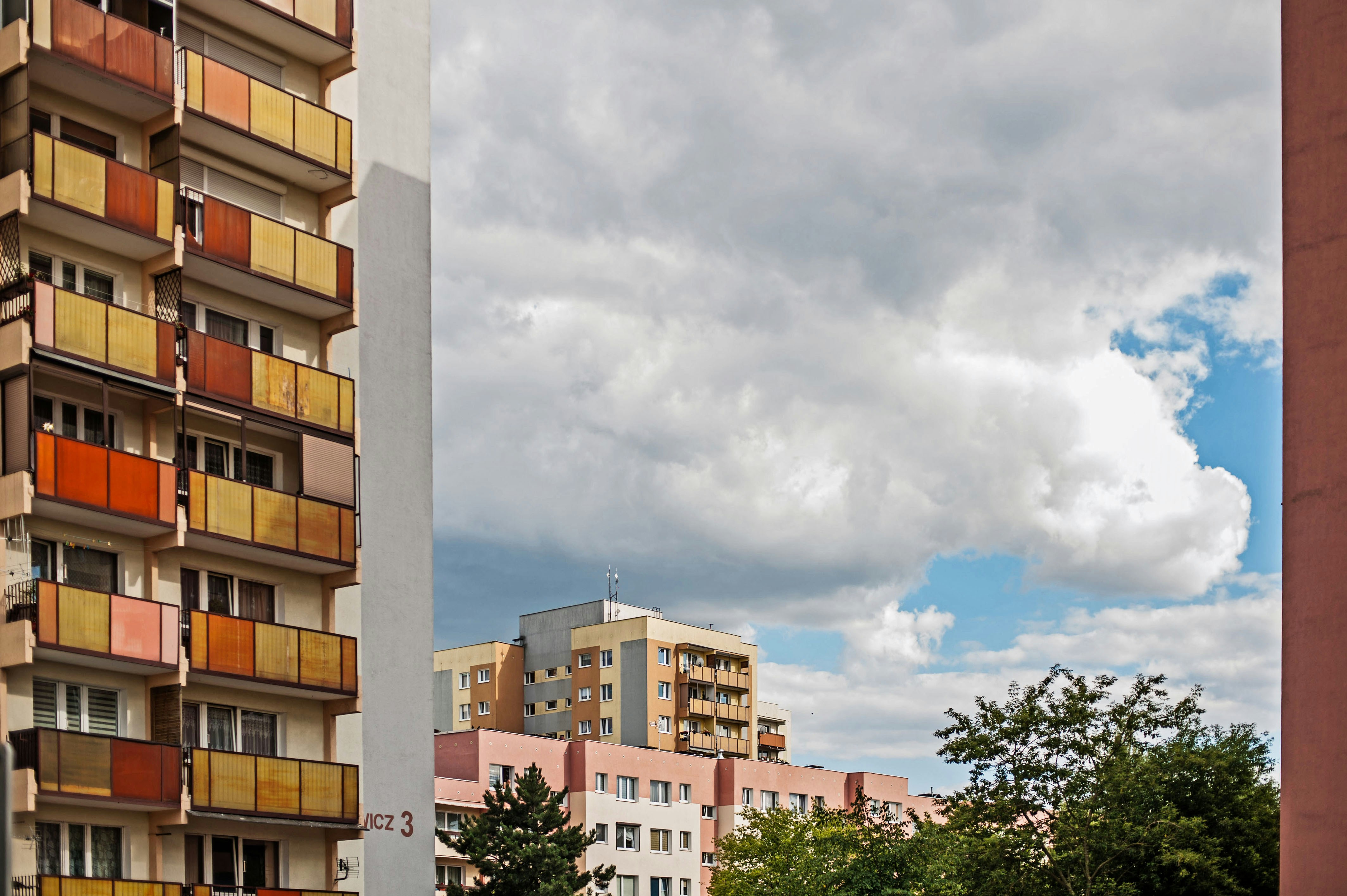 a tall building with balconies and balconies on it