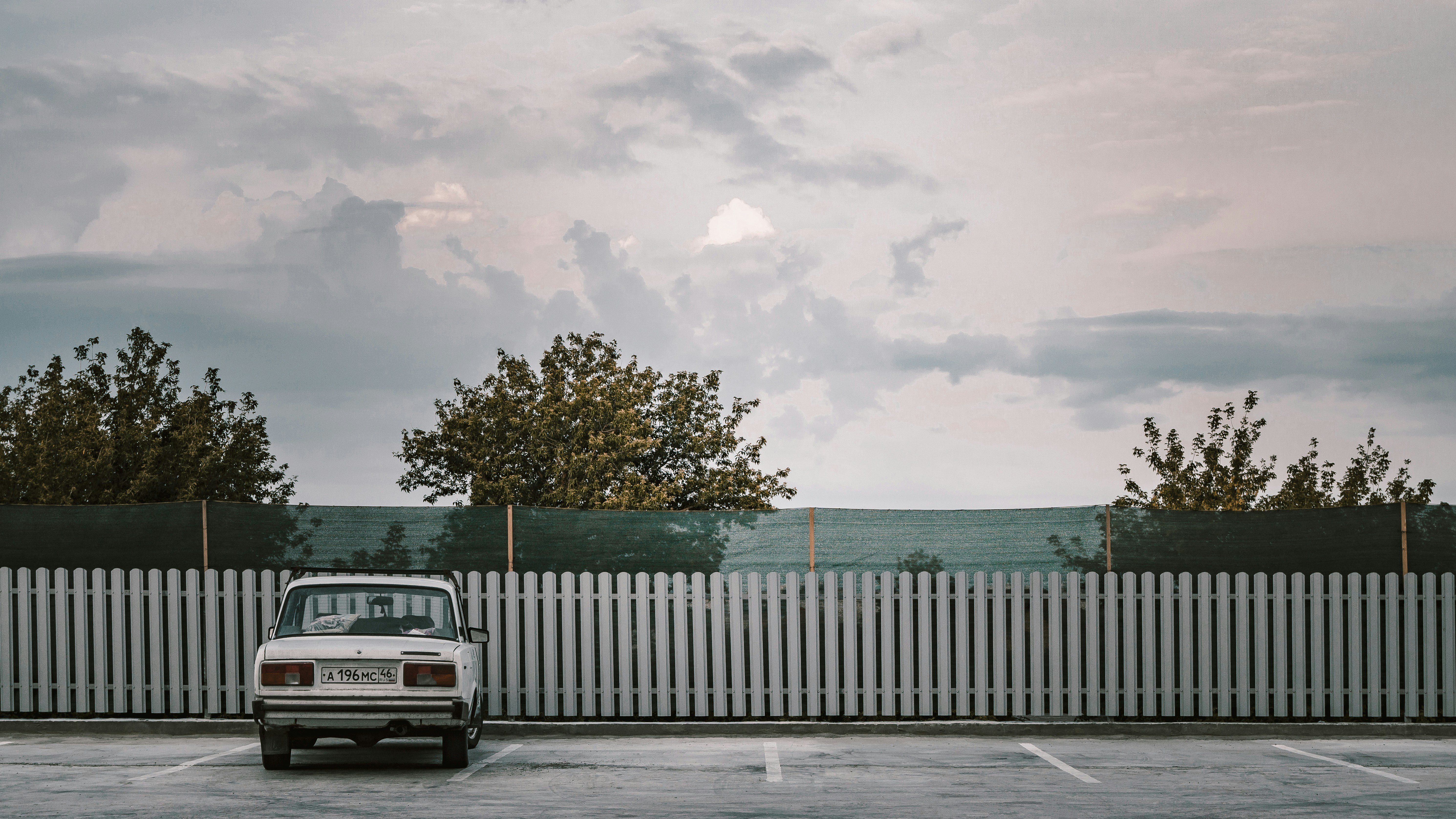 A Quiet Car in a Distant Parking Lot