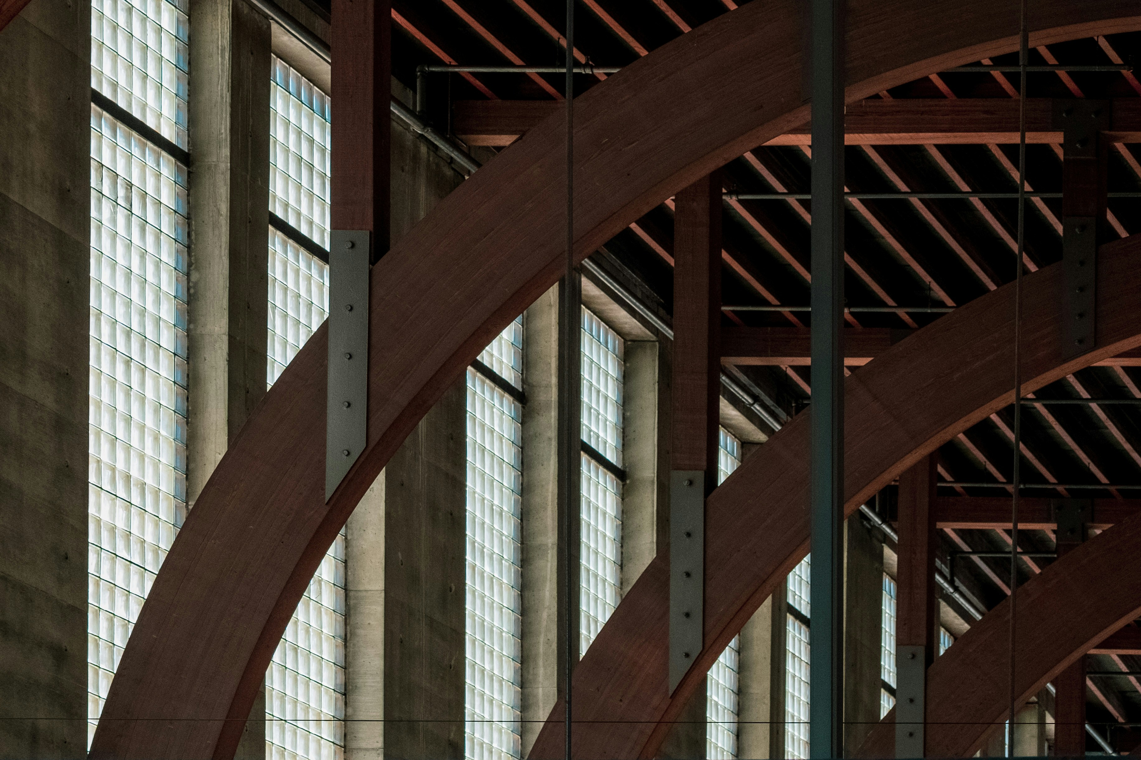 A large building with a bunch of windows in it photo – Free ...